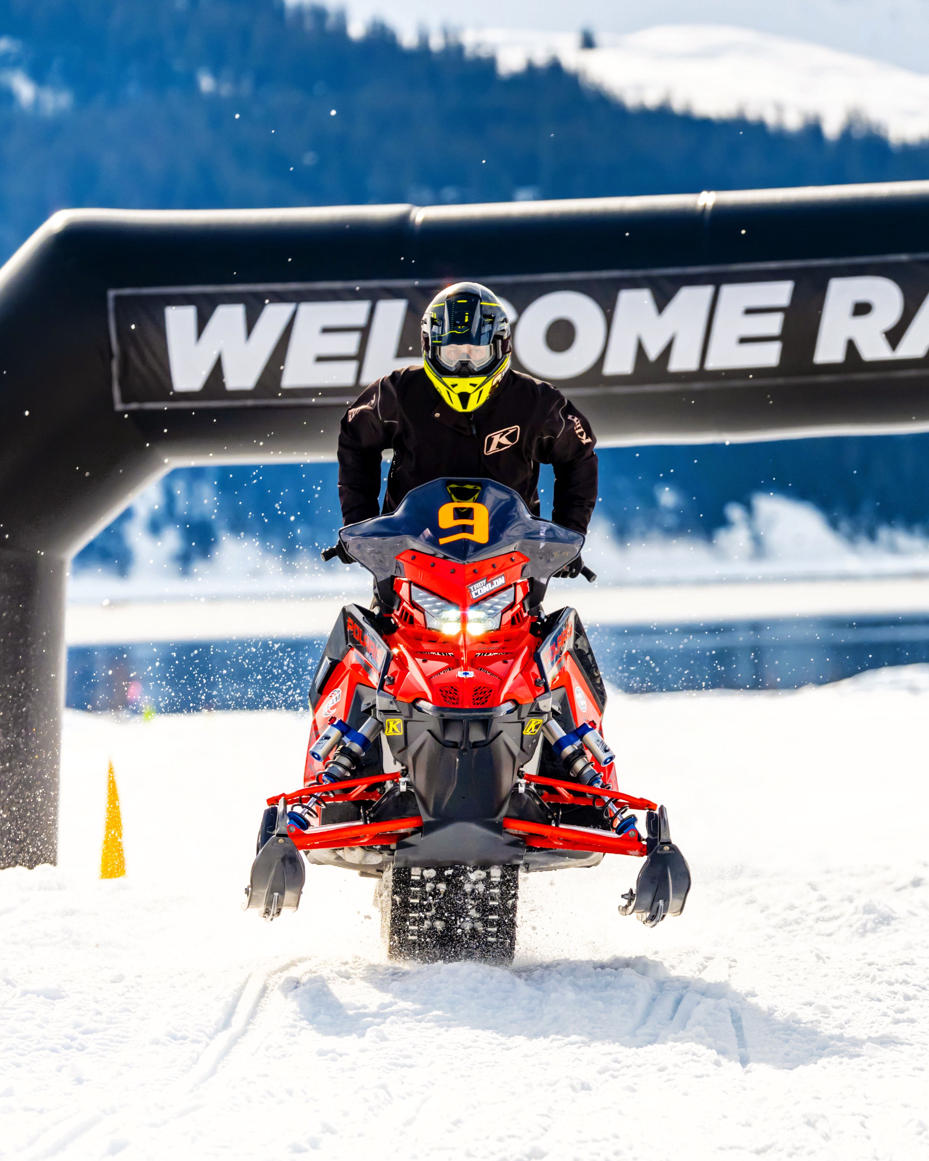 A Man Riding White and Black Snowmobile · Free Stock Photo