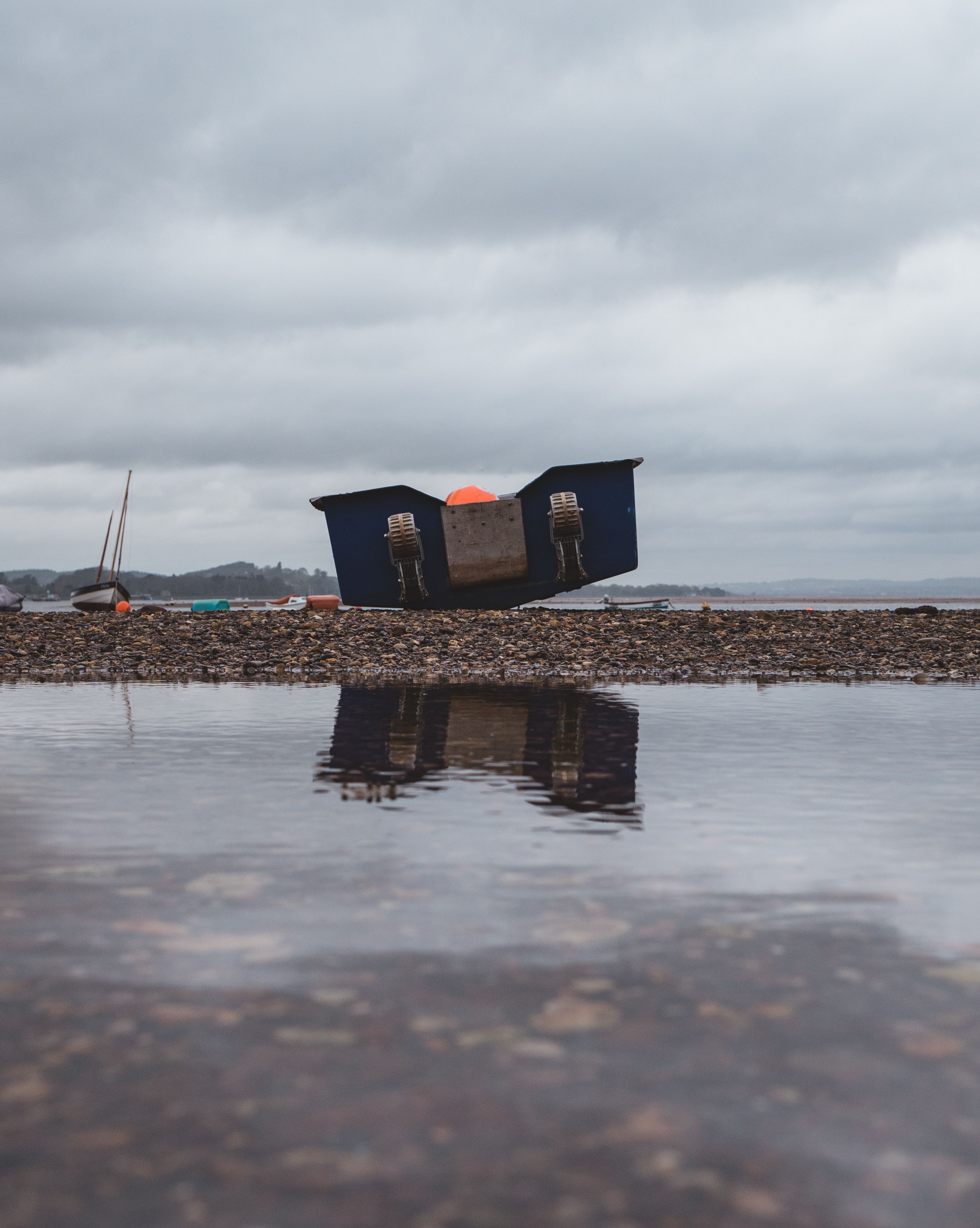 Boat Reflecting in Bay · Free Stock Photo