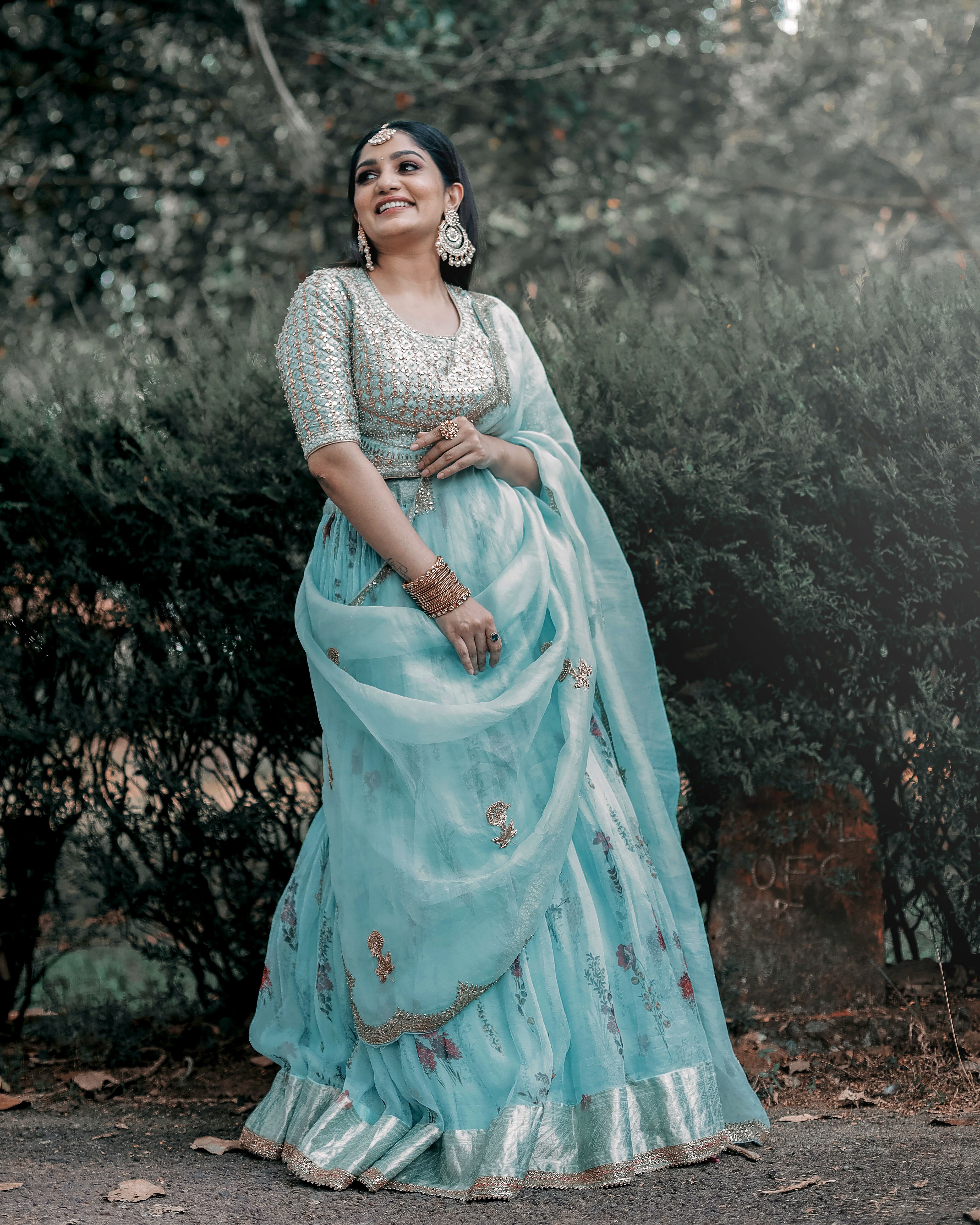 Photo of a Woman Wearing a Blue Dress · Free Stock Photo