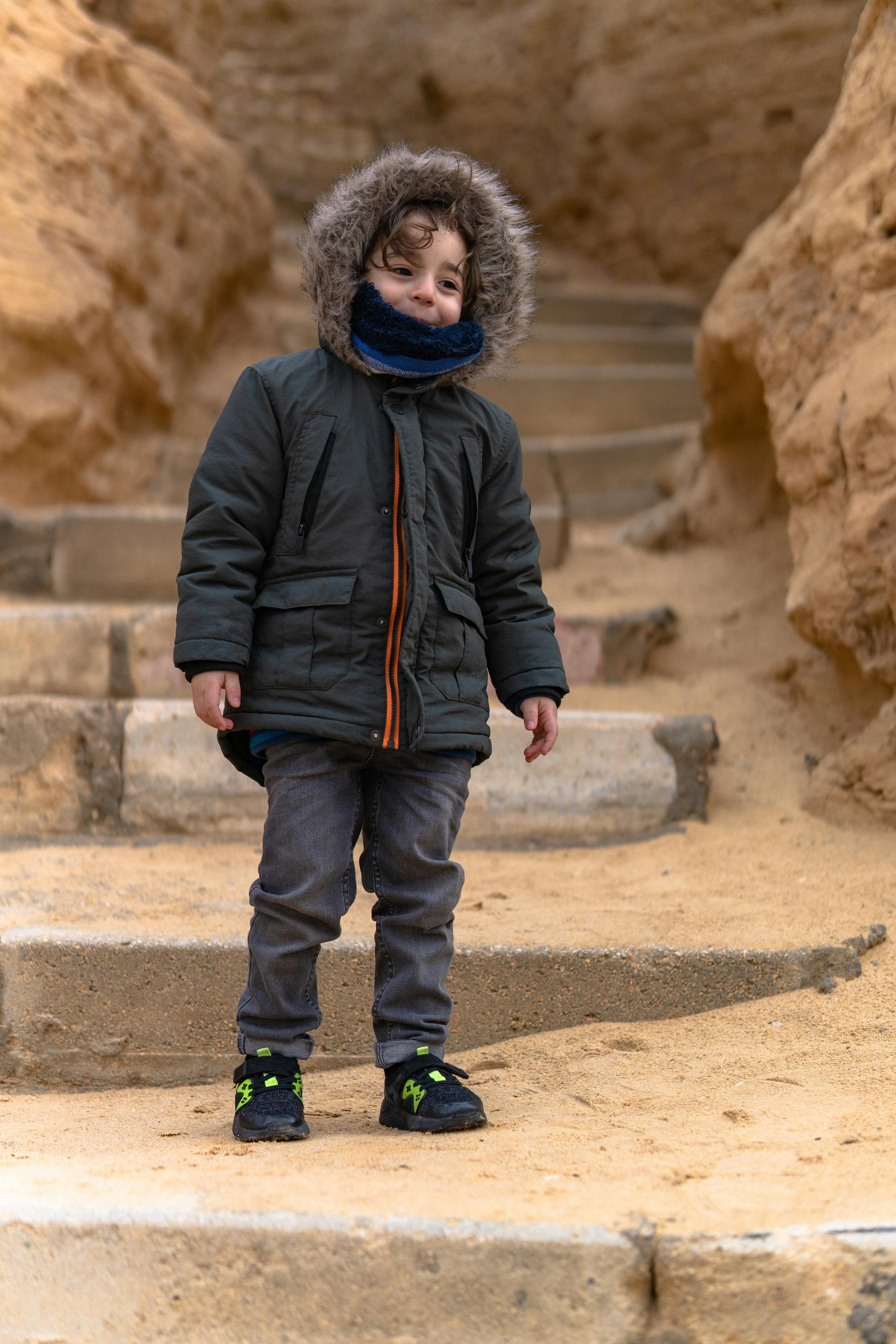 Photo of a Child Wearing a Black Jacket · Free Stock Photo