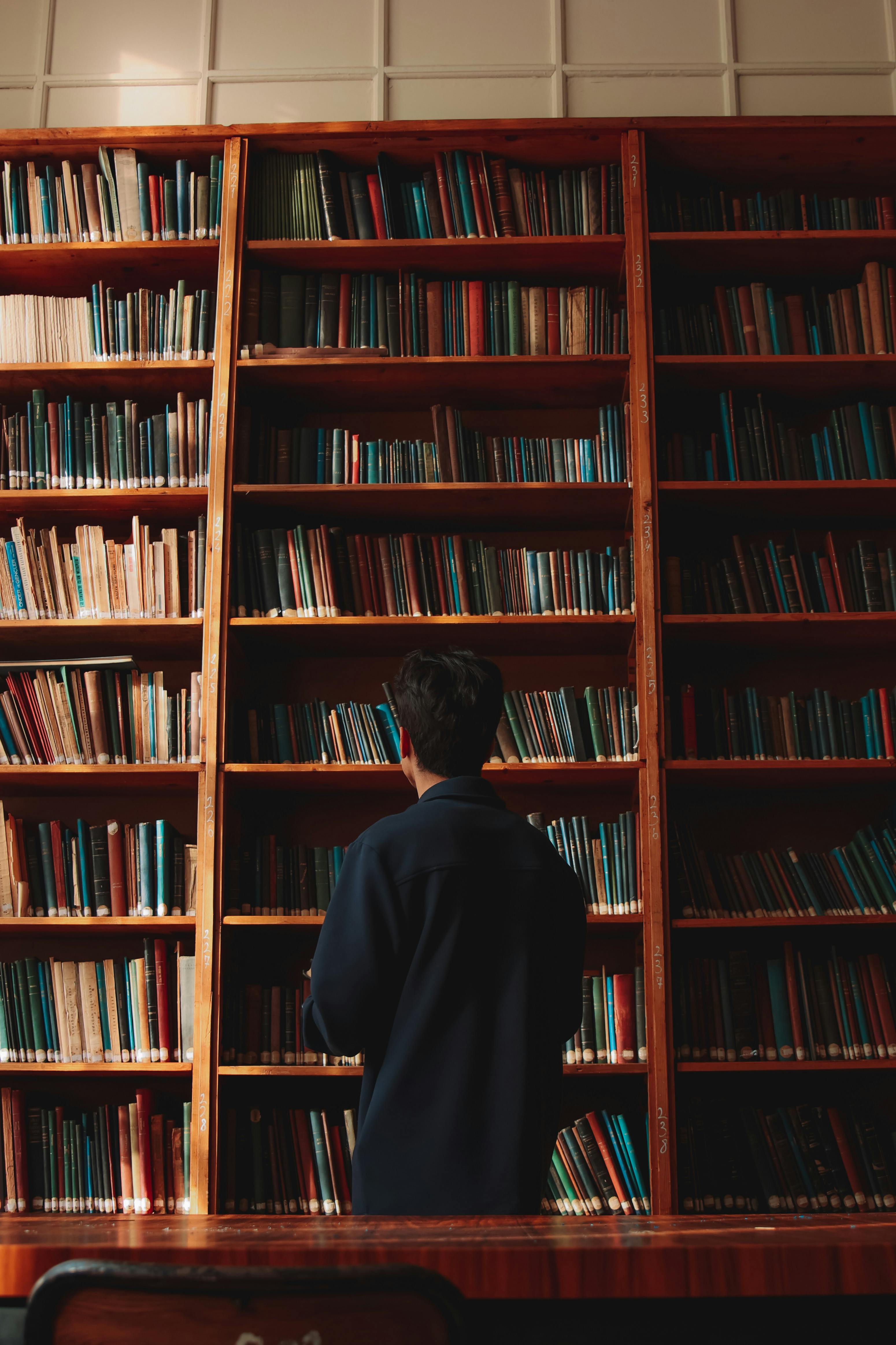 Man in Library · Free Stock Photo