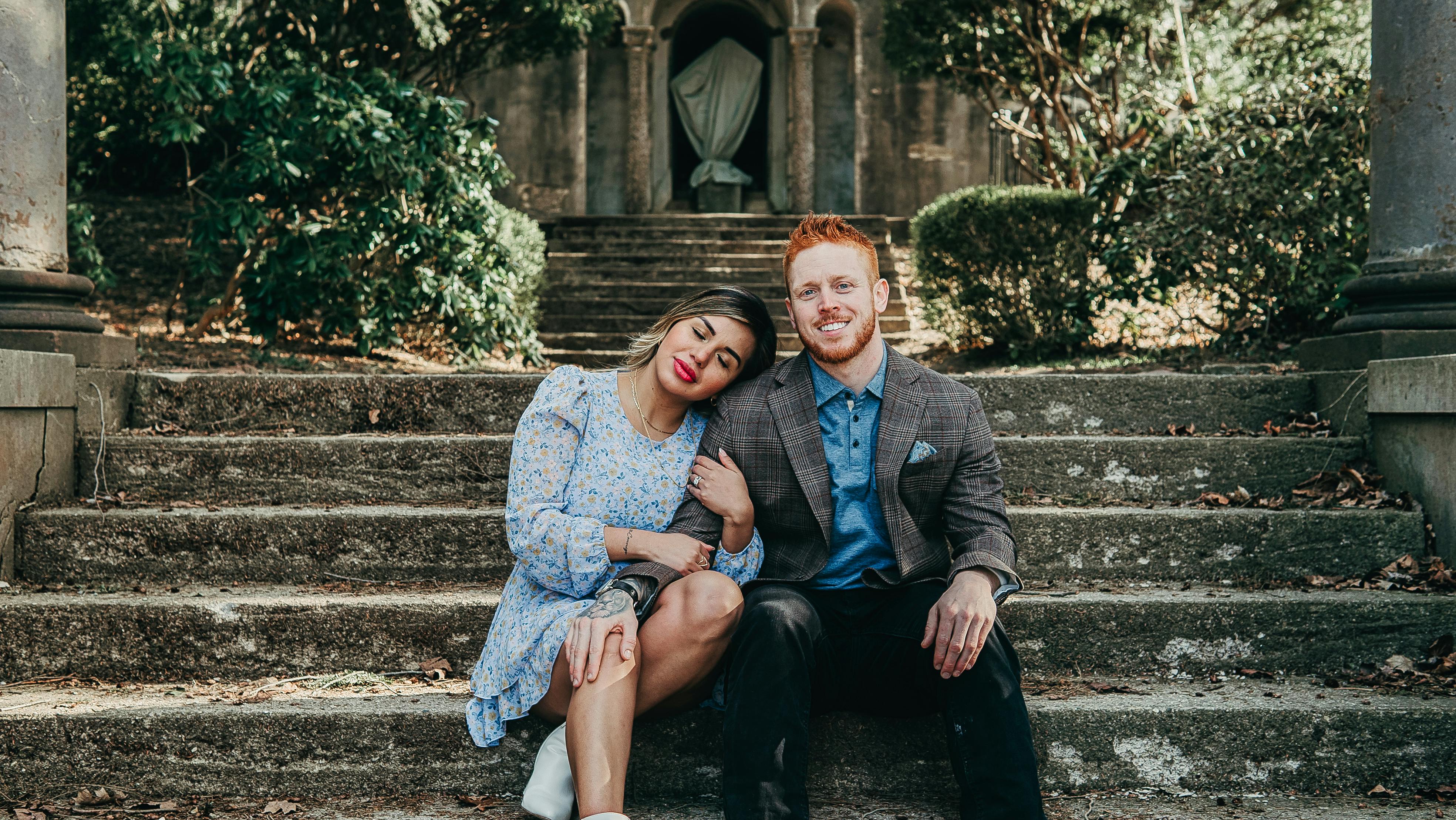 Smiling Couple on Stairs · Free Stock Photo