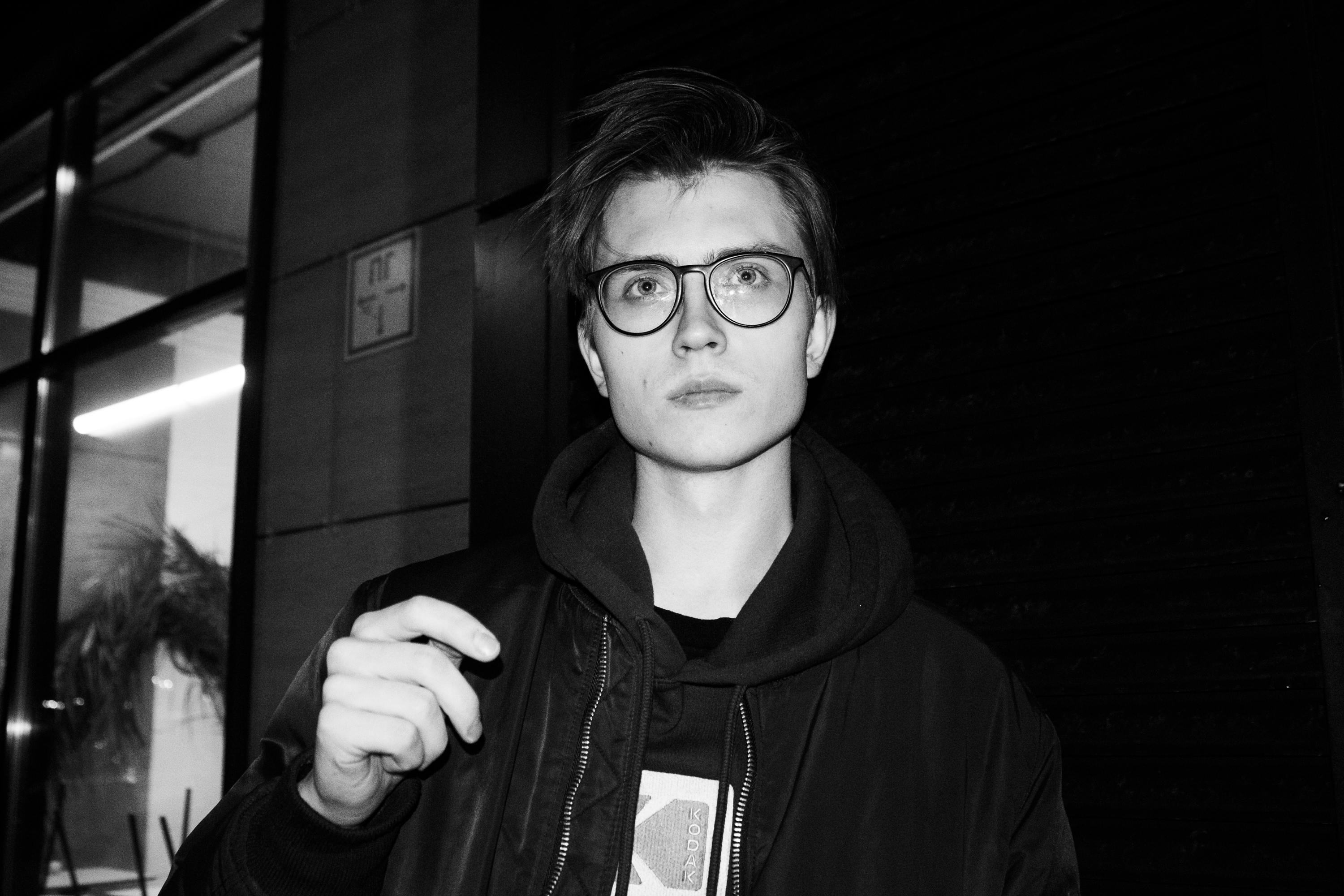 Grayscale Portrait of a Man Wearing a Suit Jacket · Free Stock Photo