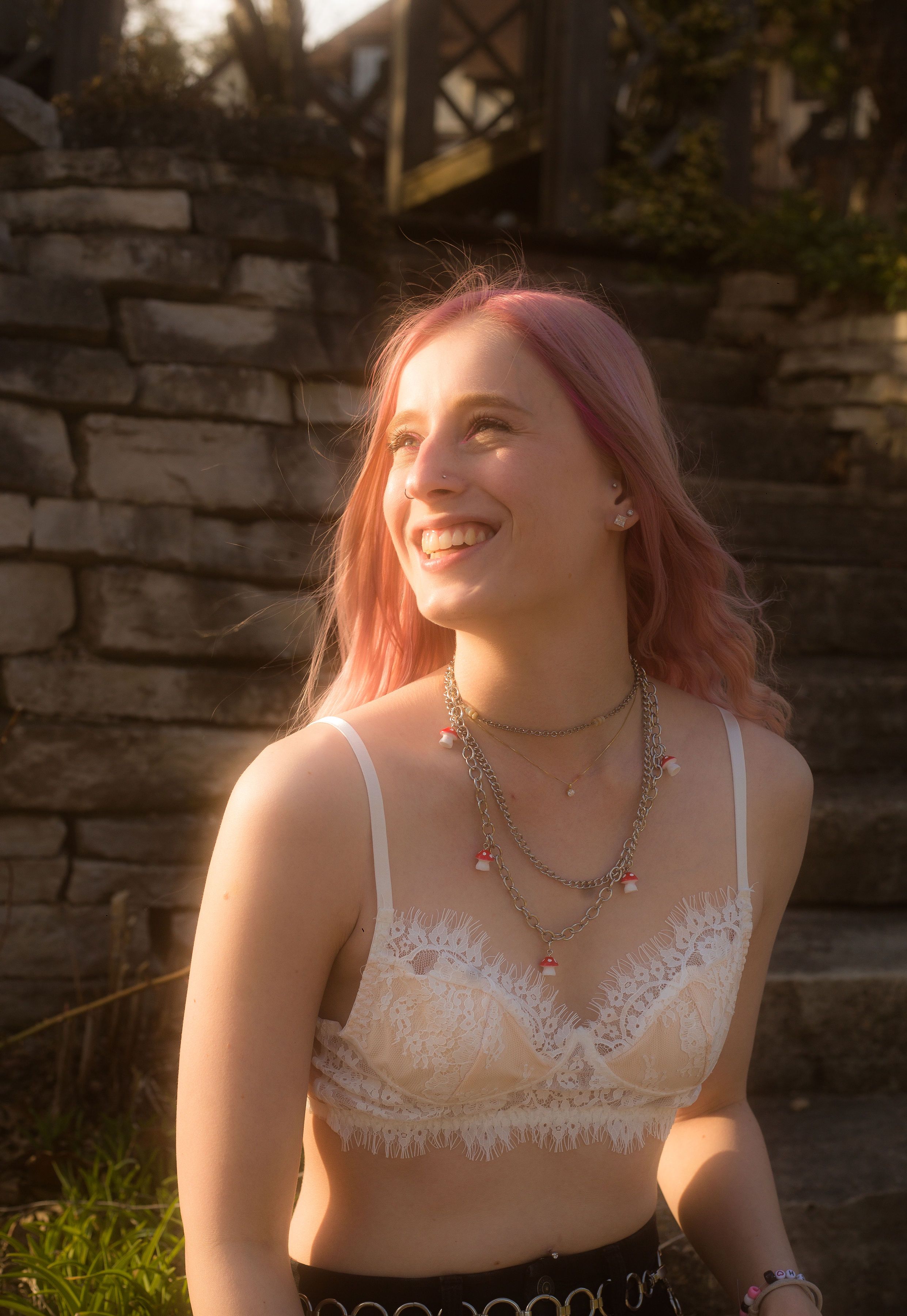 A Portrait of a Woman with Dyed Hair Wearing a Lace Bralette · Free ...