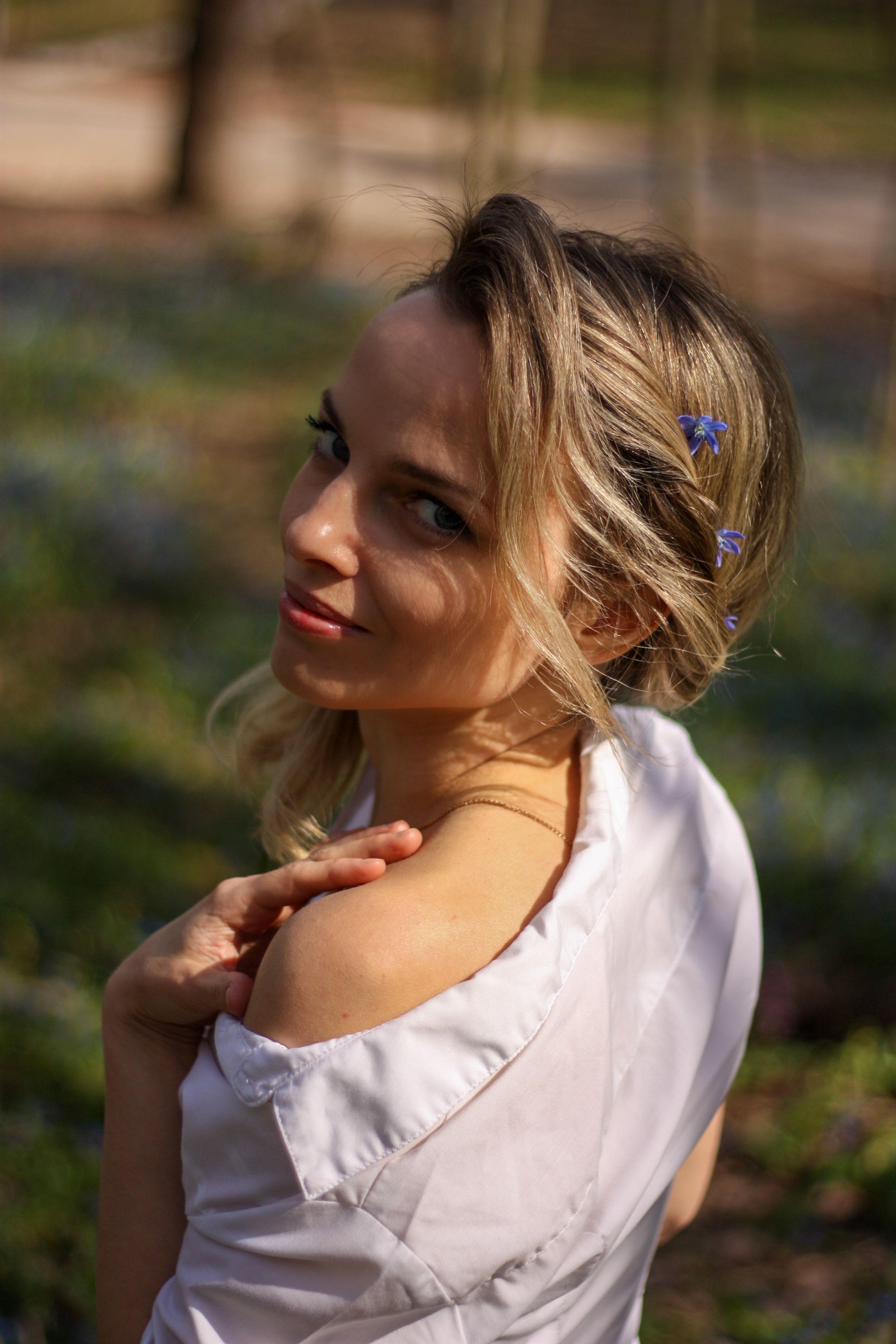 Close-Up Shot of a Pretty Woman in White Top · Free Stock Photo