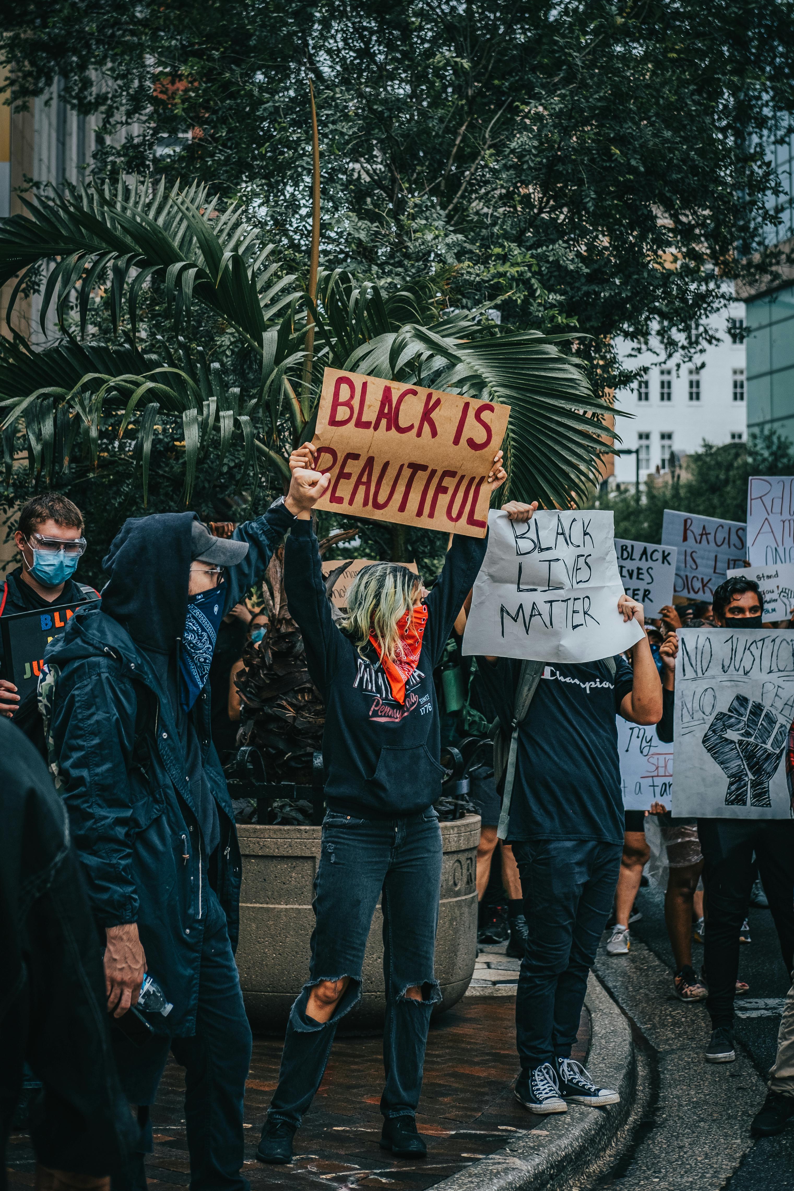 Group of People Protesting on Street · Free Stock Photo
