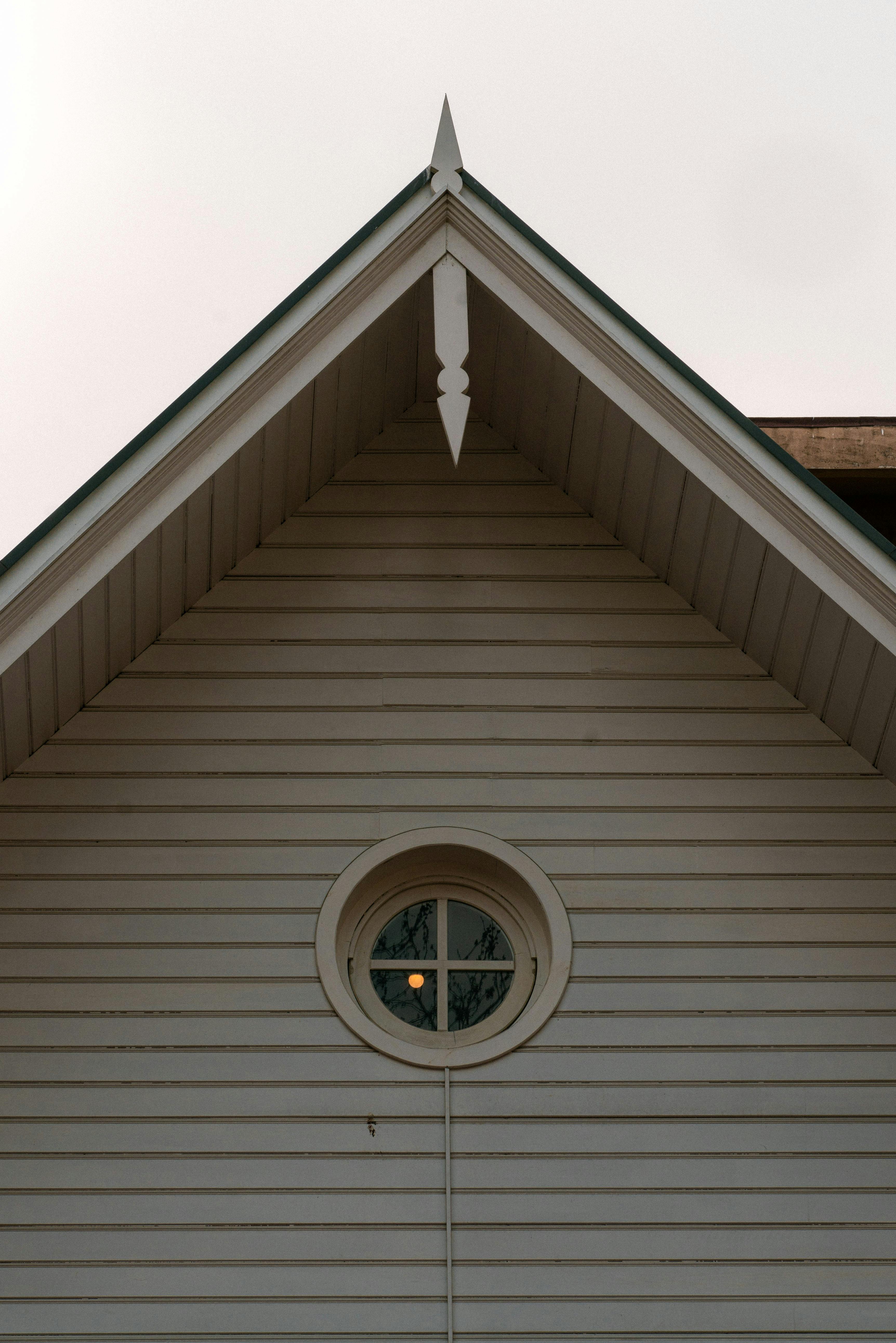 Small Round Attic Window · Free Stock Photo