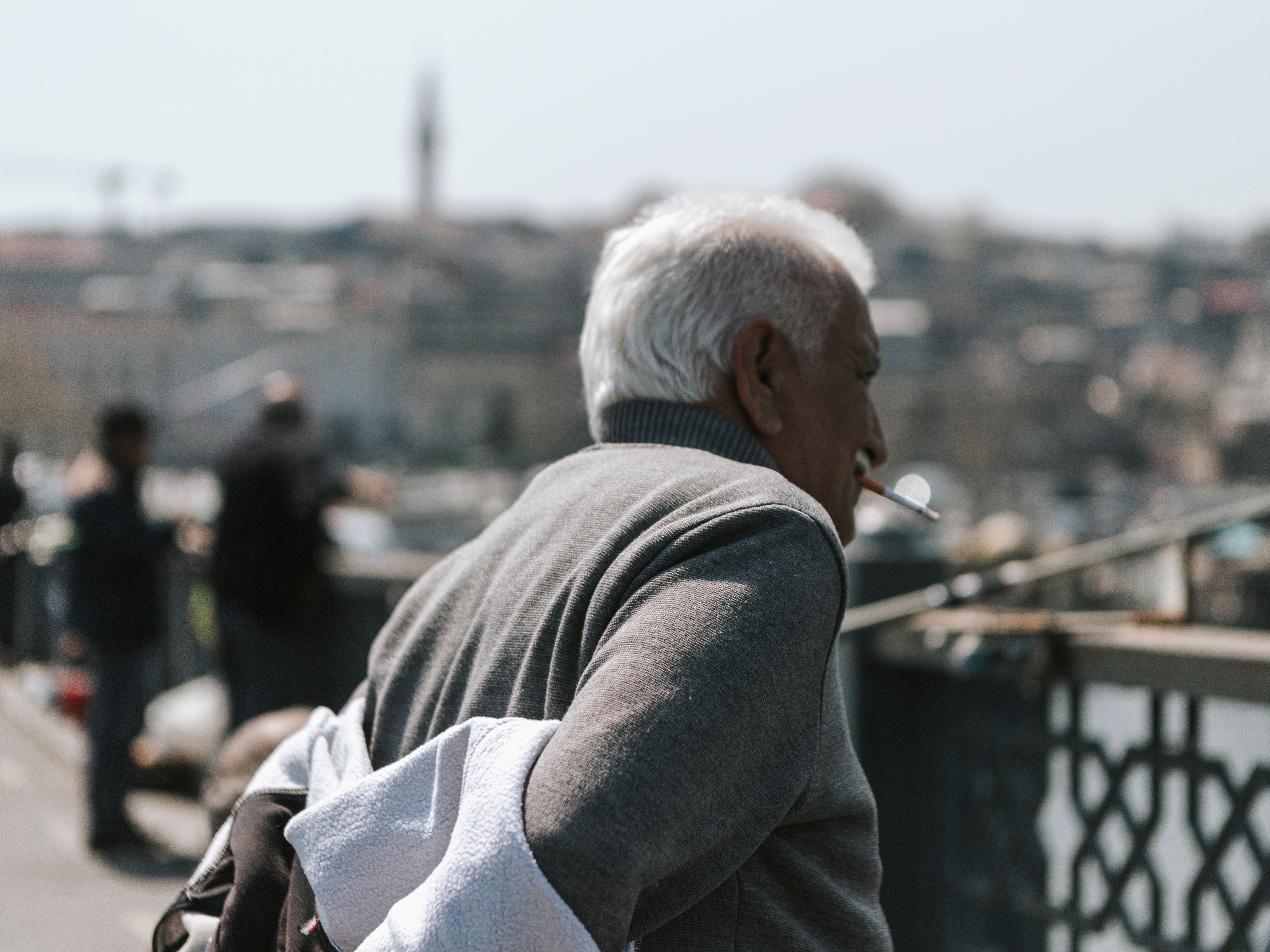 Middle-aged Man smoking Cigarette · Free Stock Photo