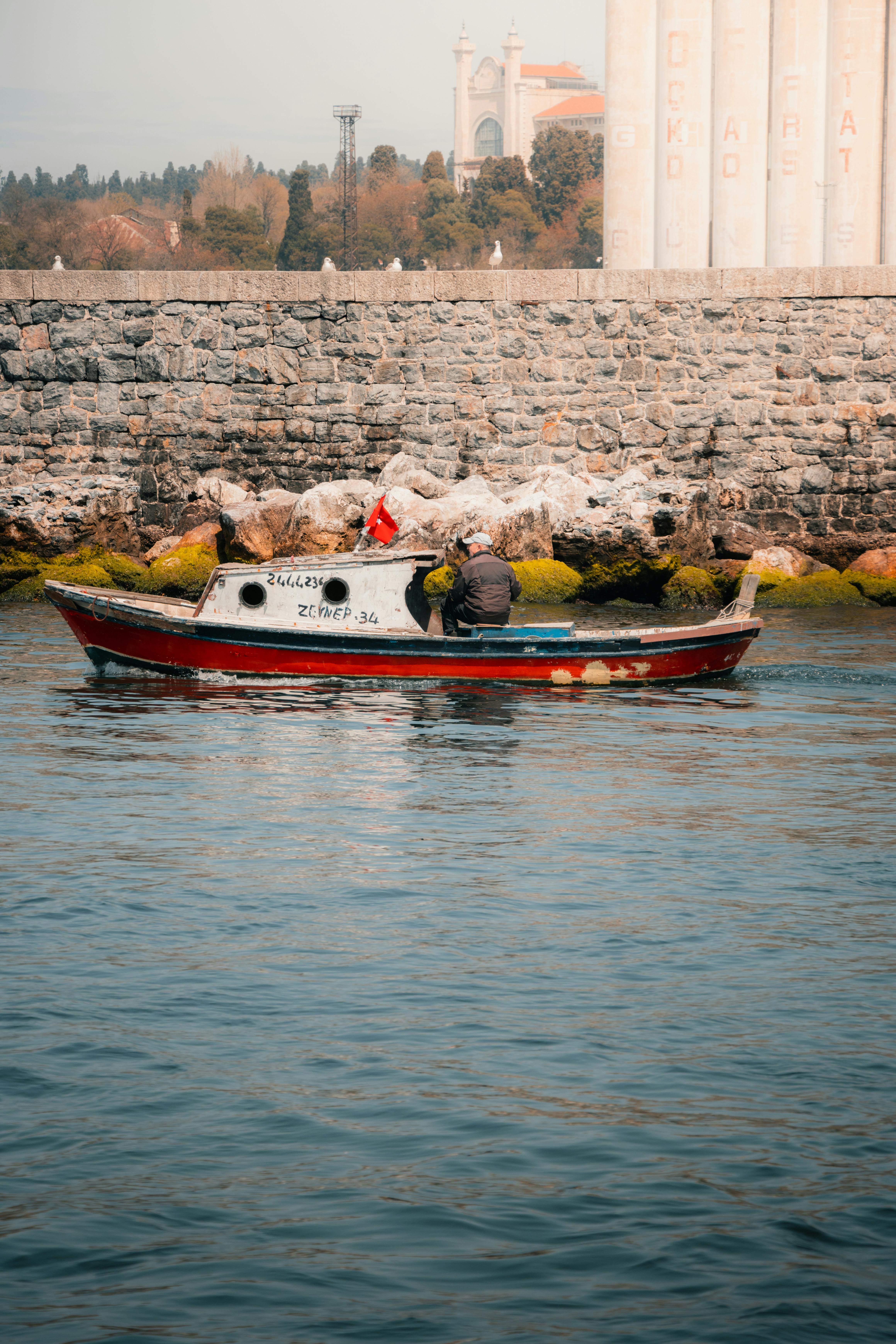 Person Riding a Boat in the River · Free Stock Photo