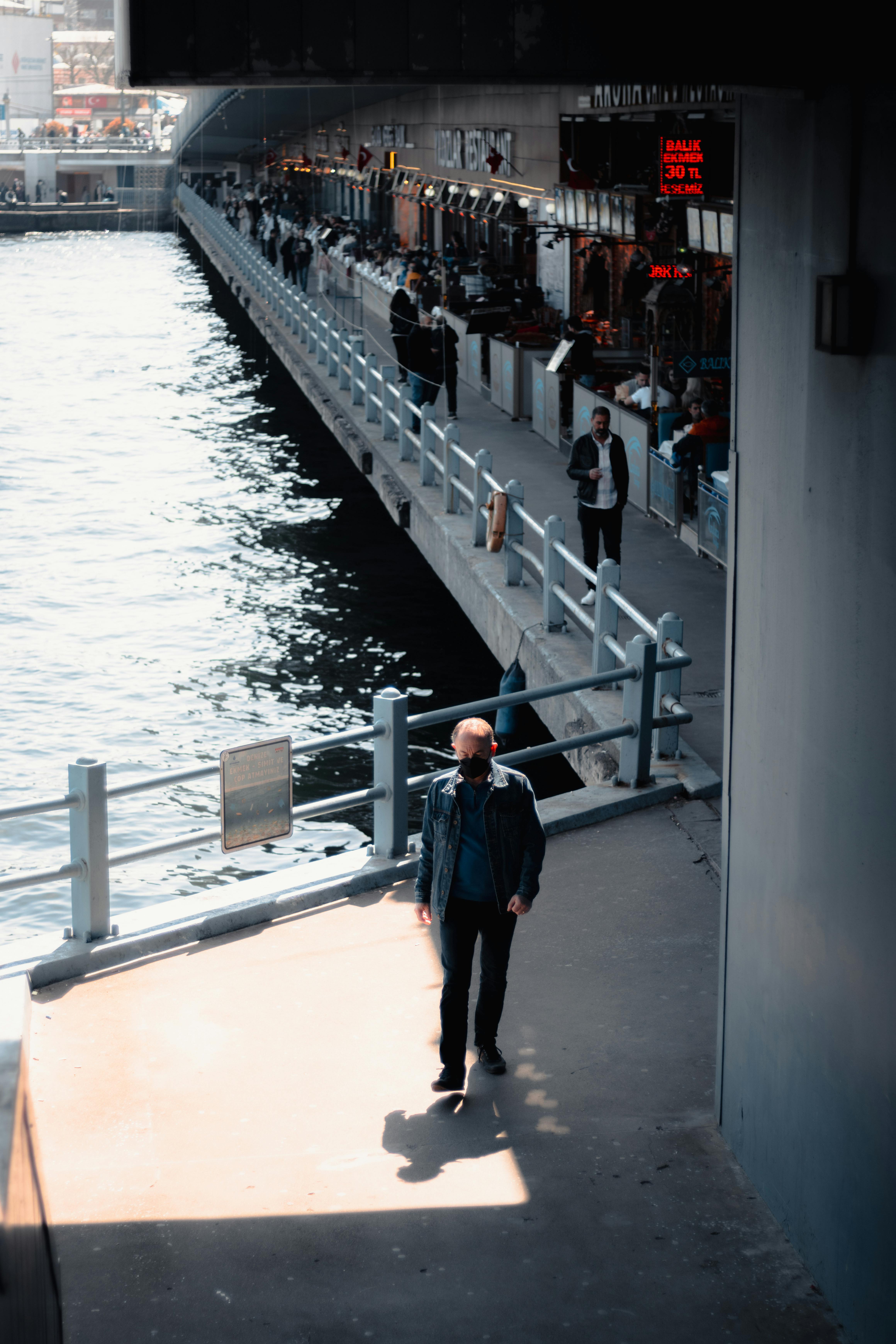 People Standing Near River · Free Stock Photo