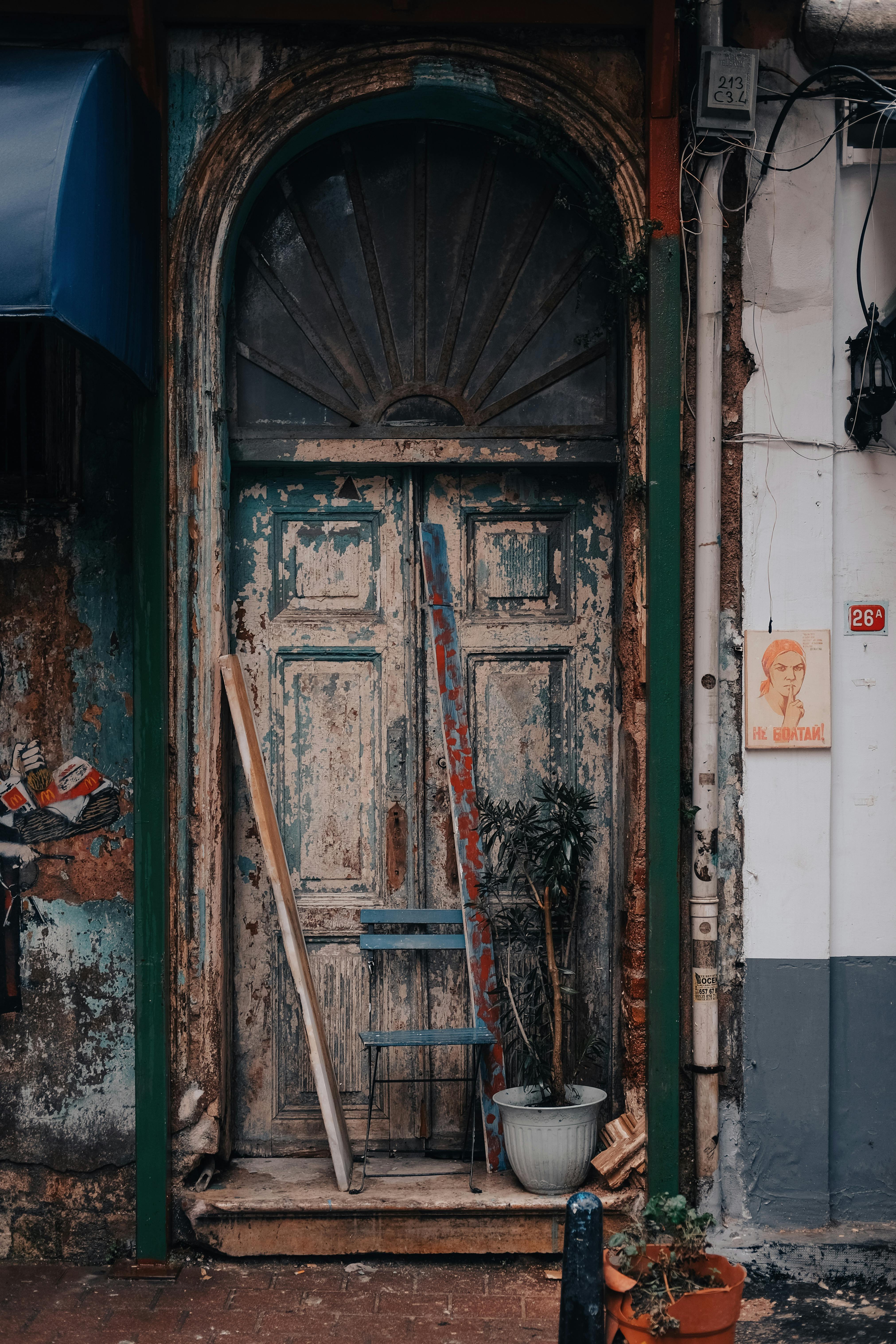 Antique Wooden Door of an Old Building · Free Stock Photo