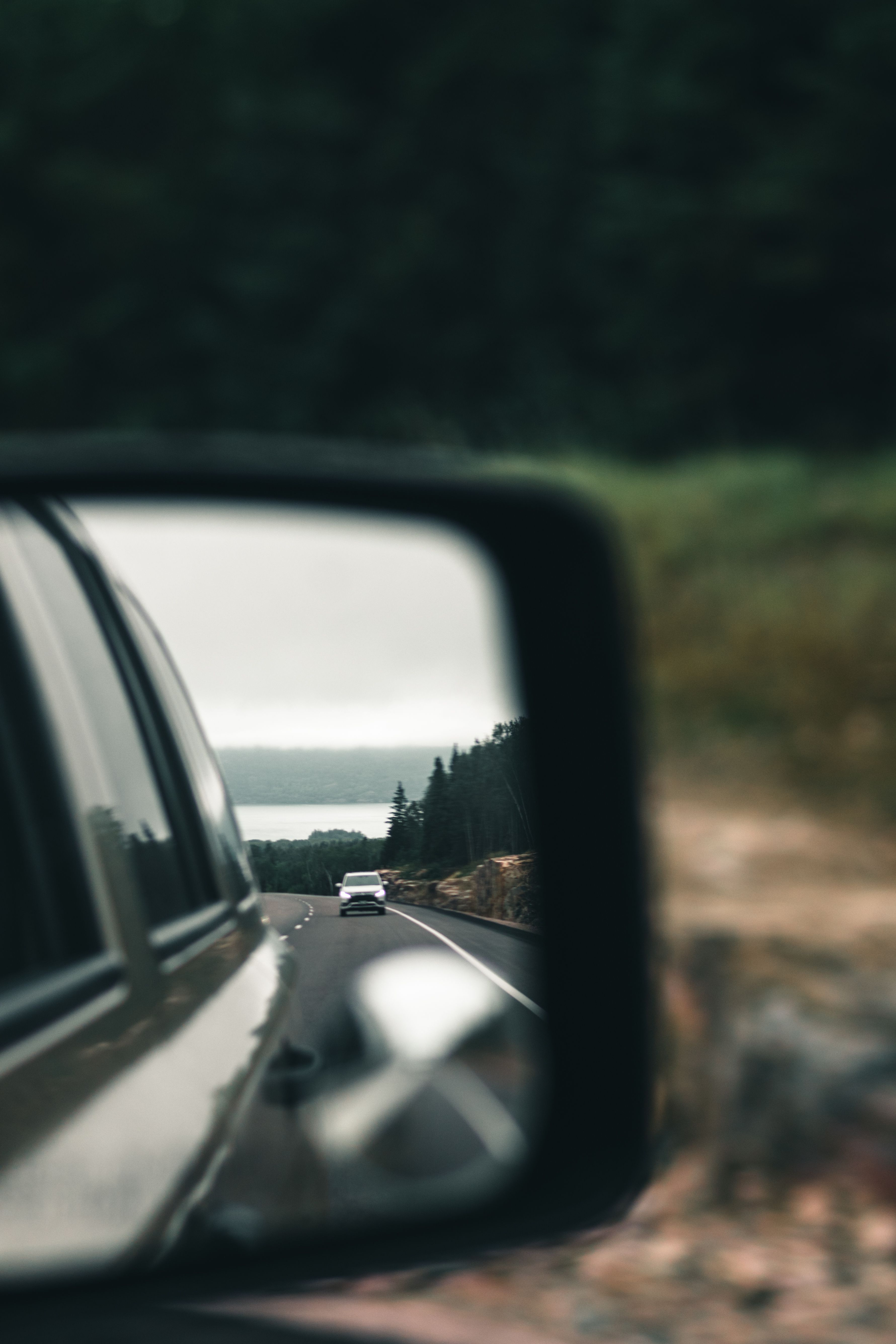 Reflection of a Car from the Side Mirror · Free Stock Photo