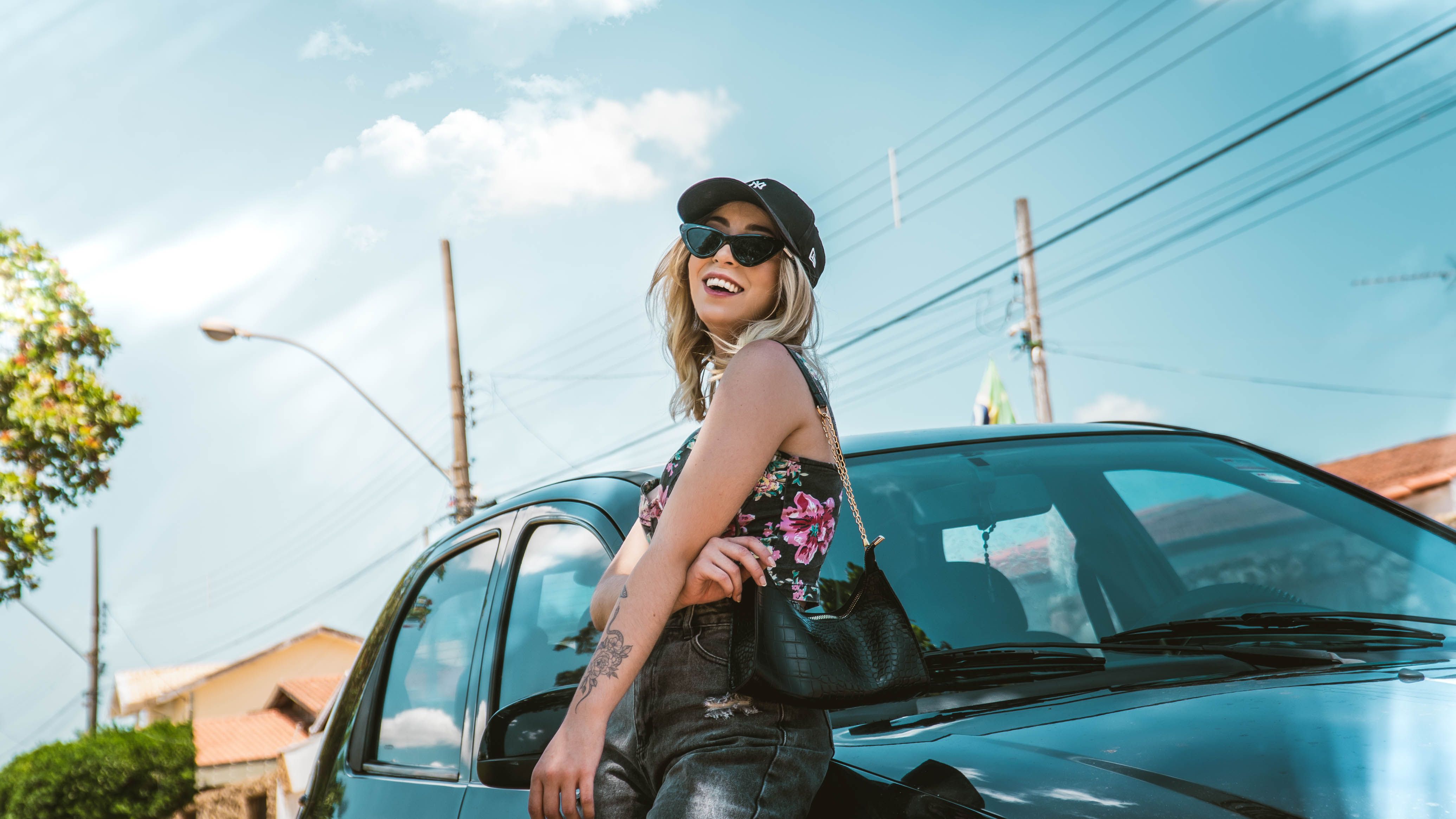 A Woman Standing in a Car · Free Stock Photo