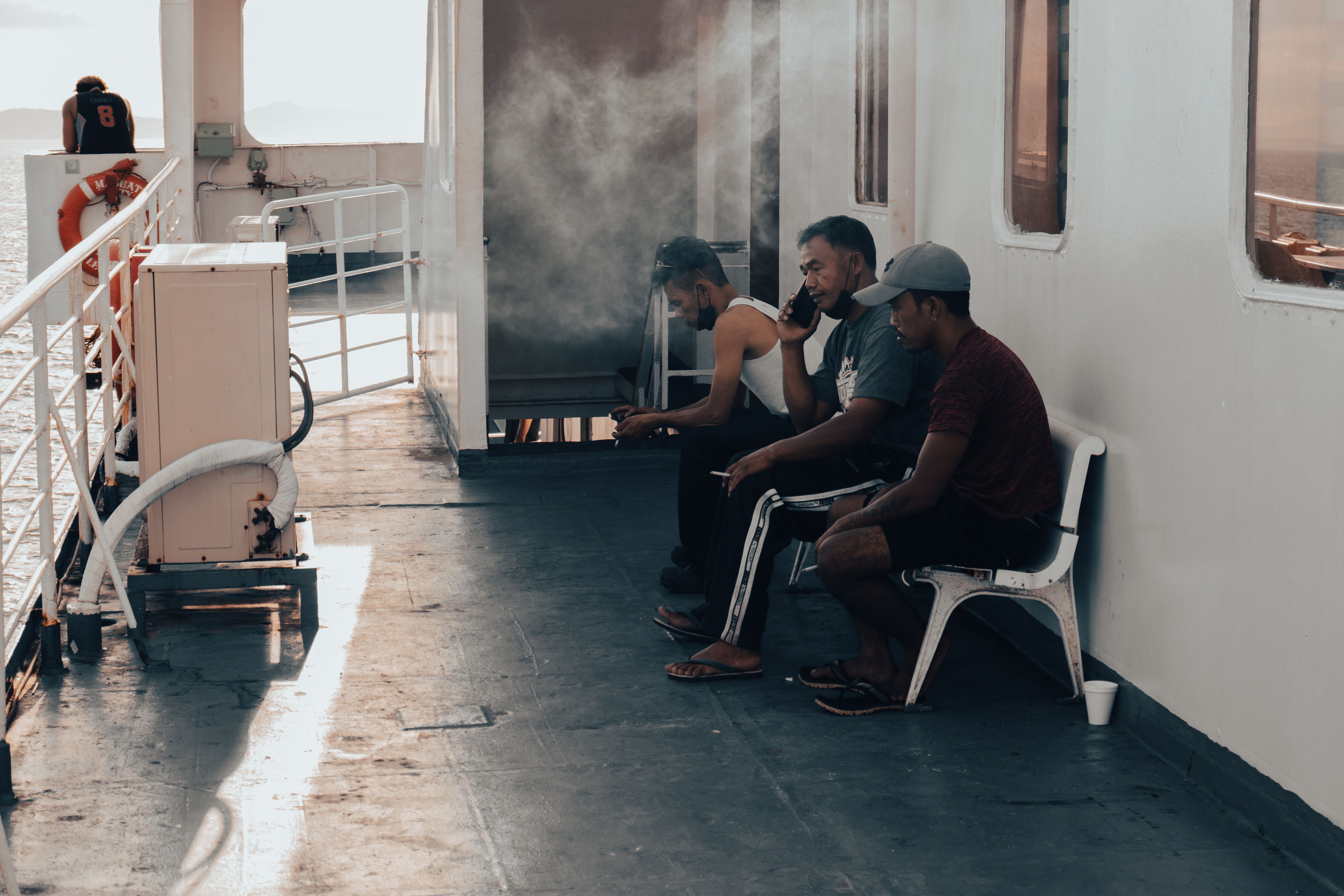 Two Men Smoking Together · Free Stock Photo