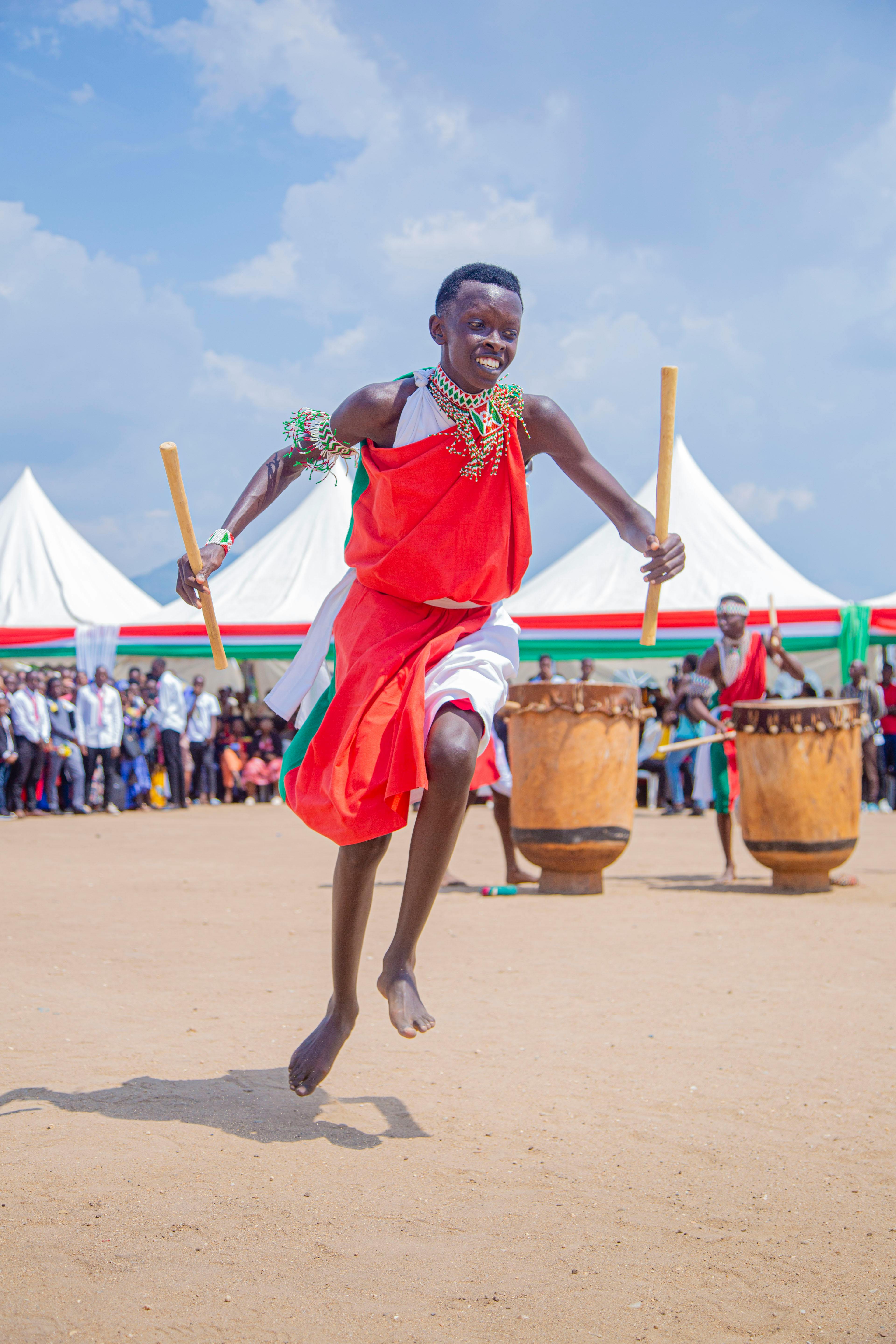 African Tribal Man with a Burundi Flag · Free Stock Photo
