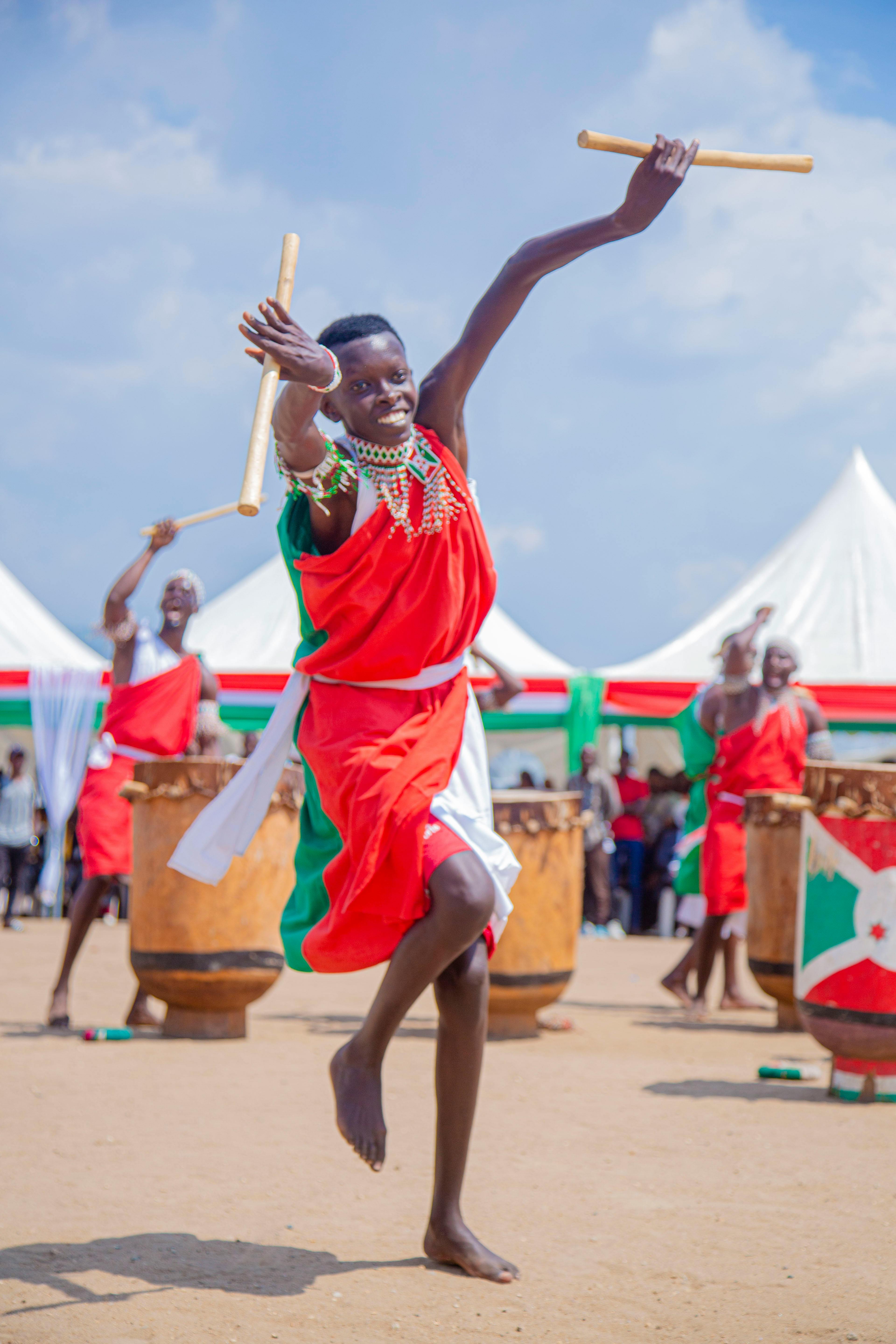 African Tribal Man with a Burundi Flag · Free Stock Photo