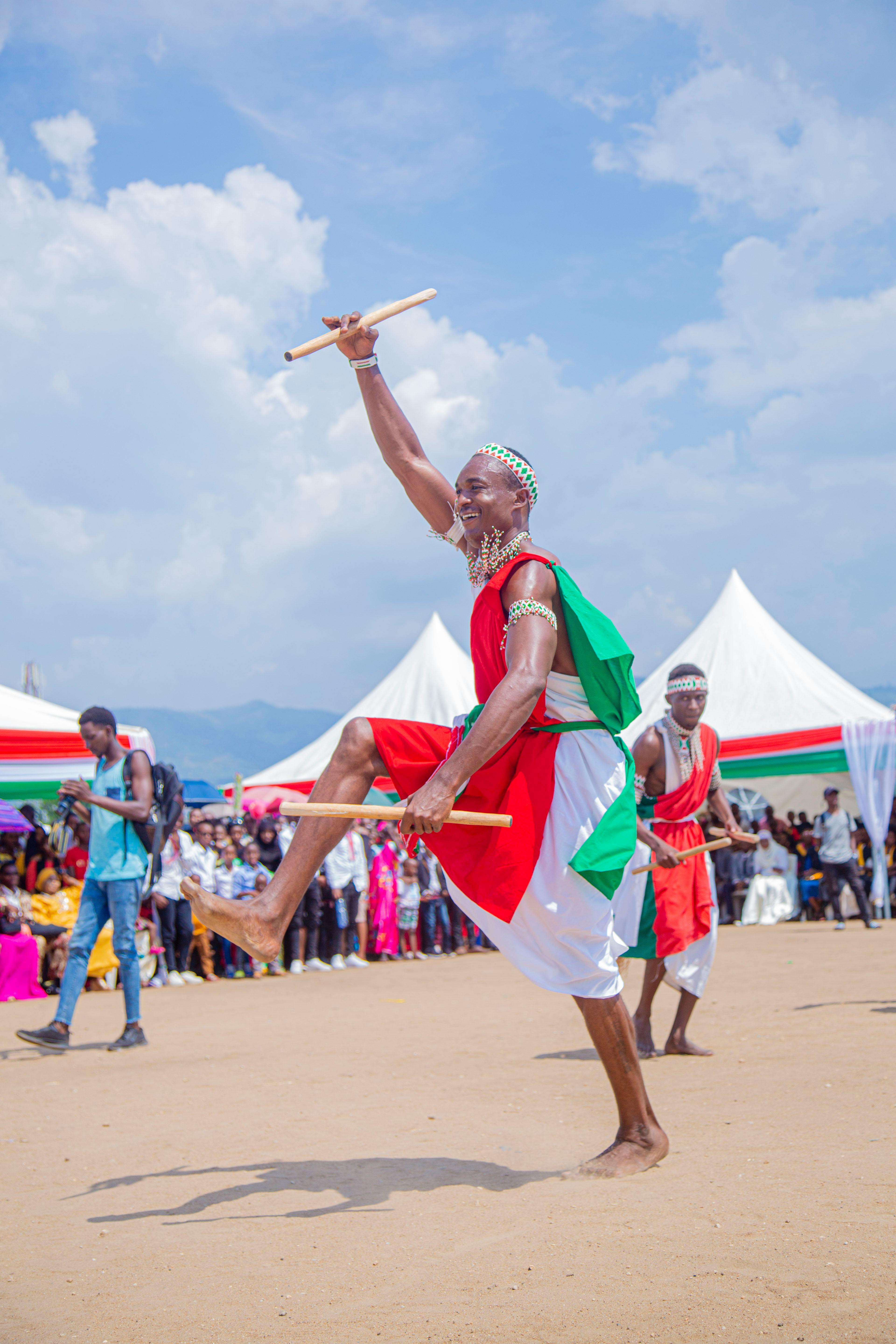 African Tribal Man with a Burundi Flag · Free Stock Photo