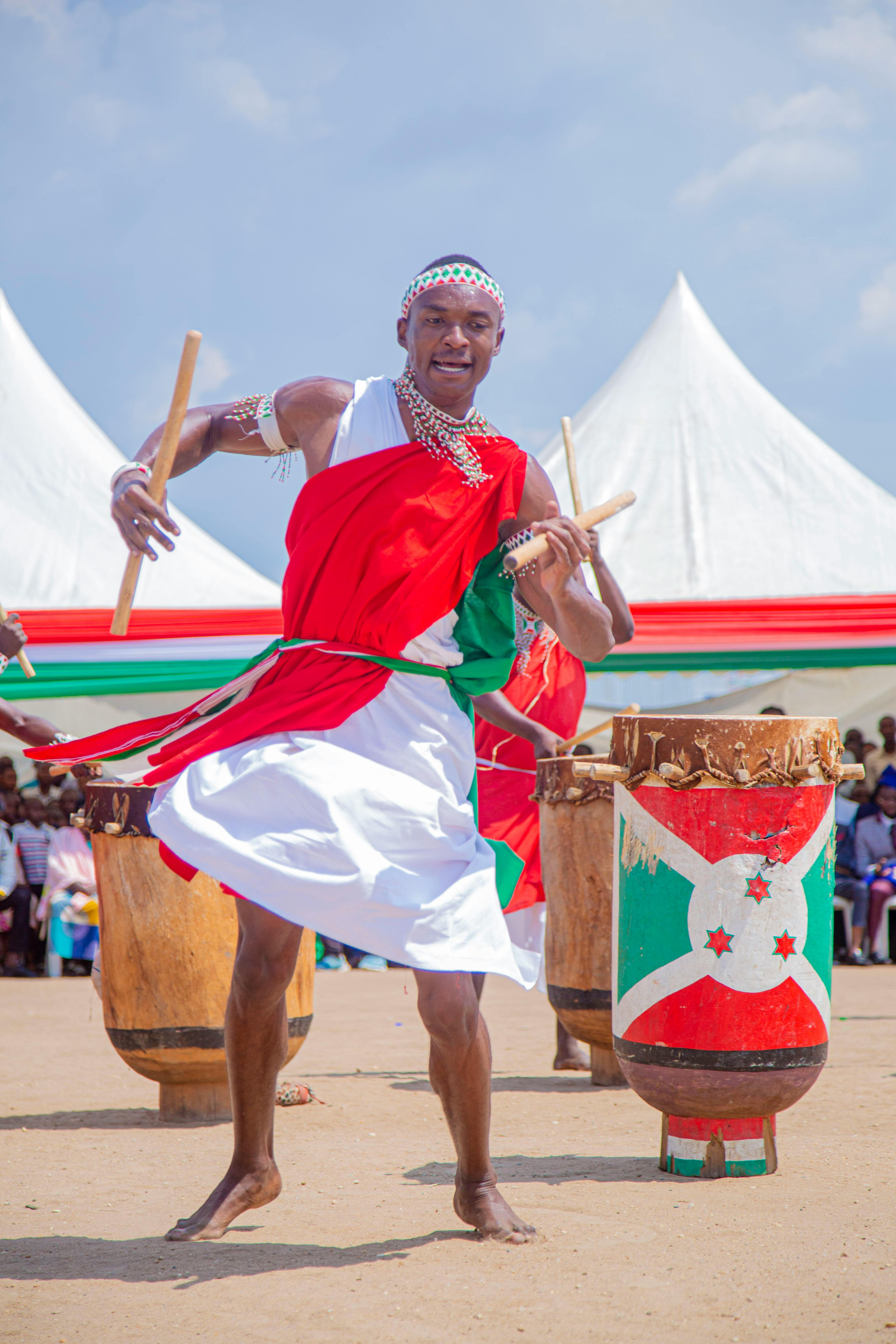 African Tribal Man with a Burundi Flag · Free Stock Photo