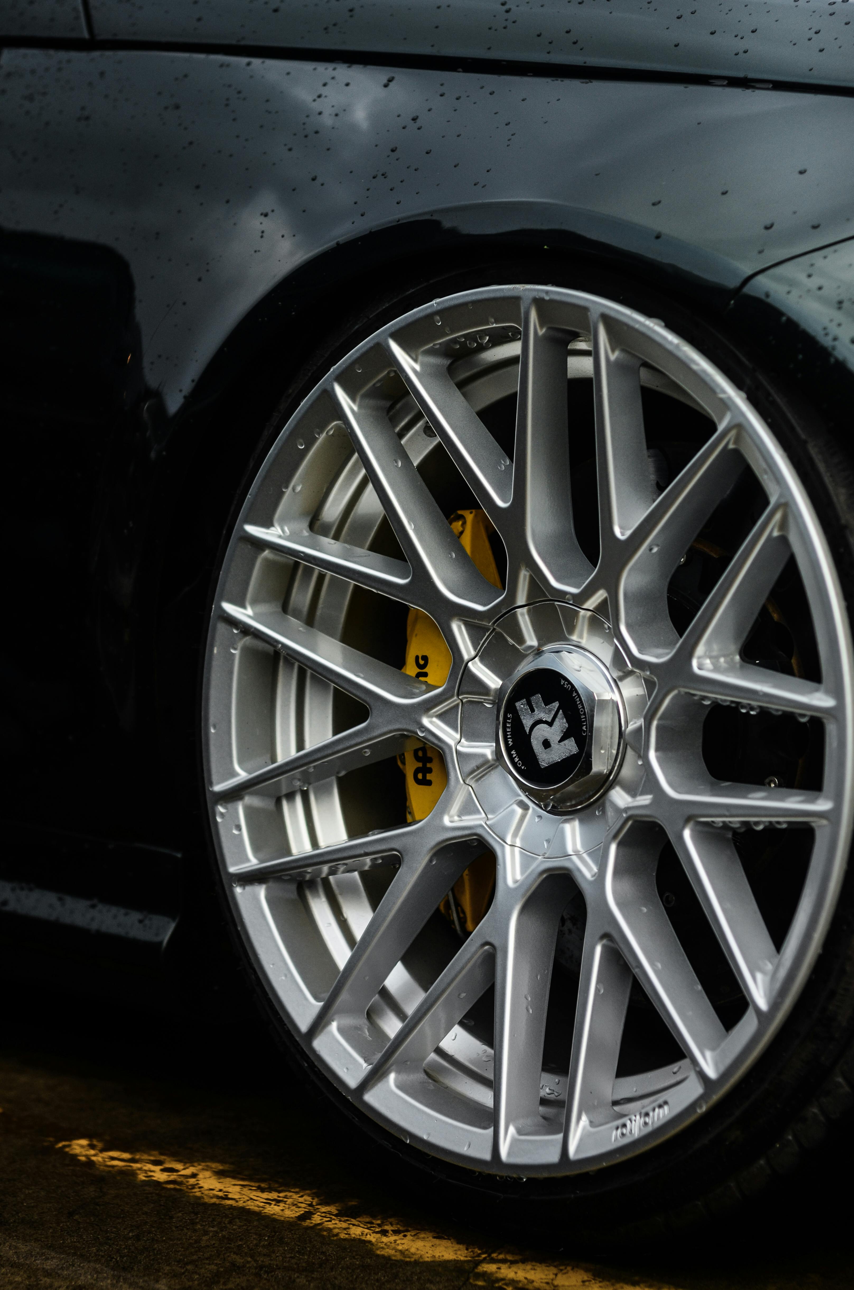 Wheel and Tire of a Black Car · Free Stock Photo