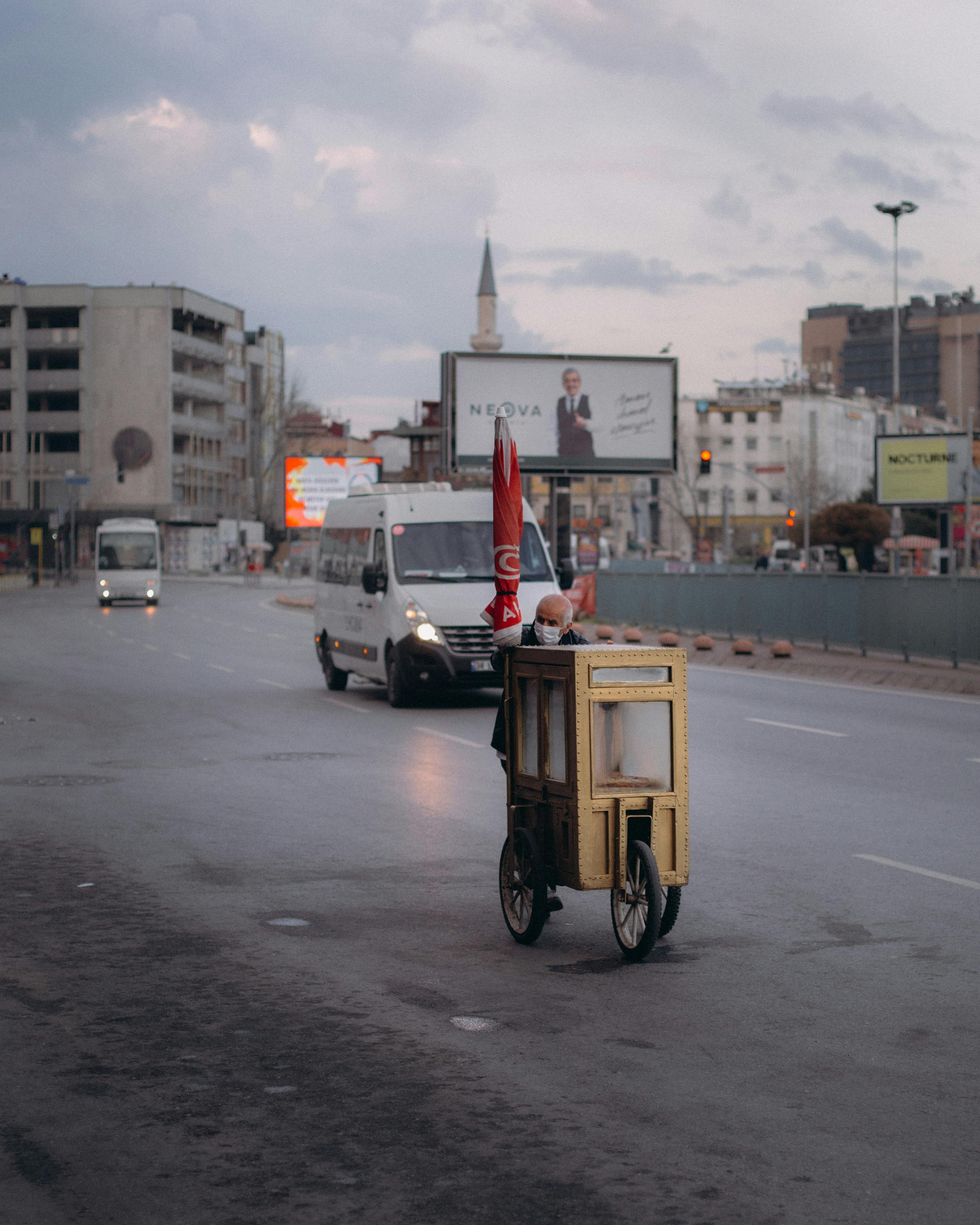 A Man Pushing His Food Cart · Free Stock Photo