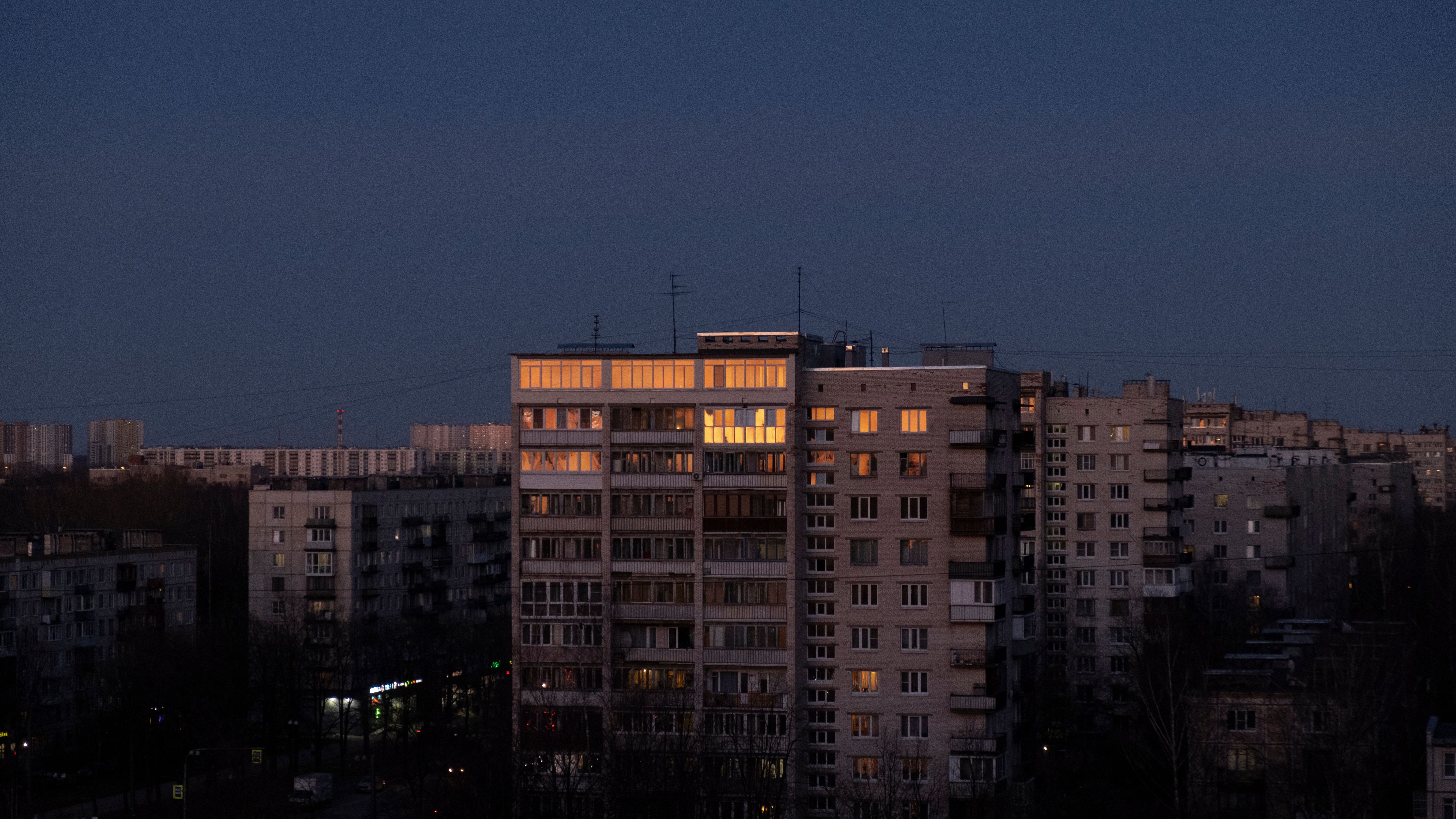 City Buildings During Night Time · Free Stock Photo