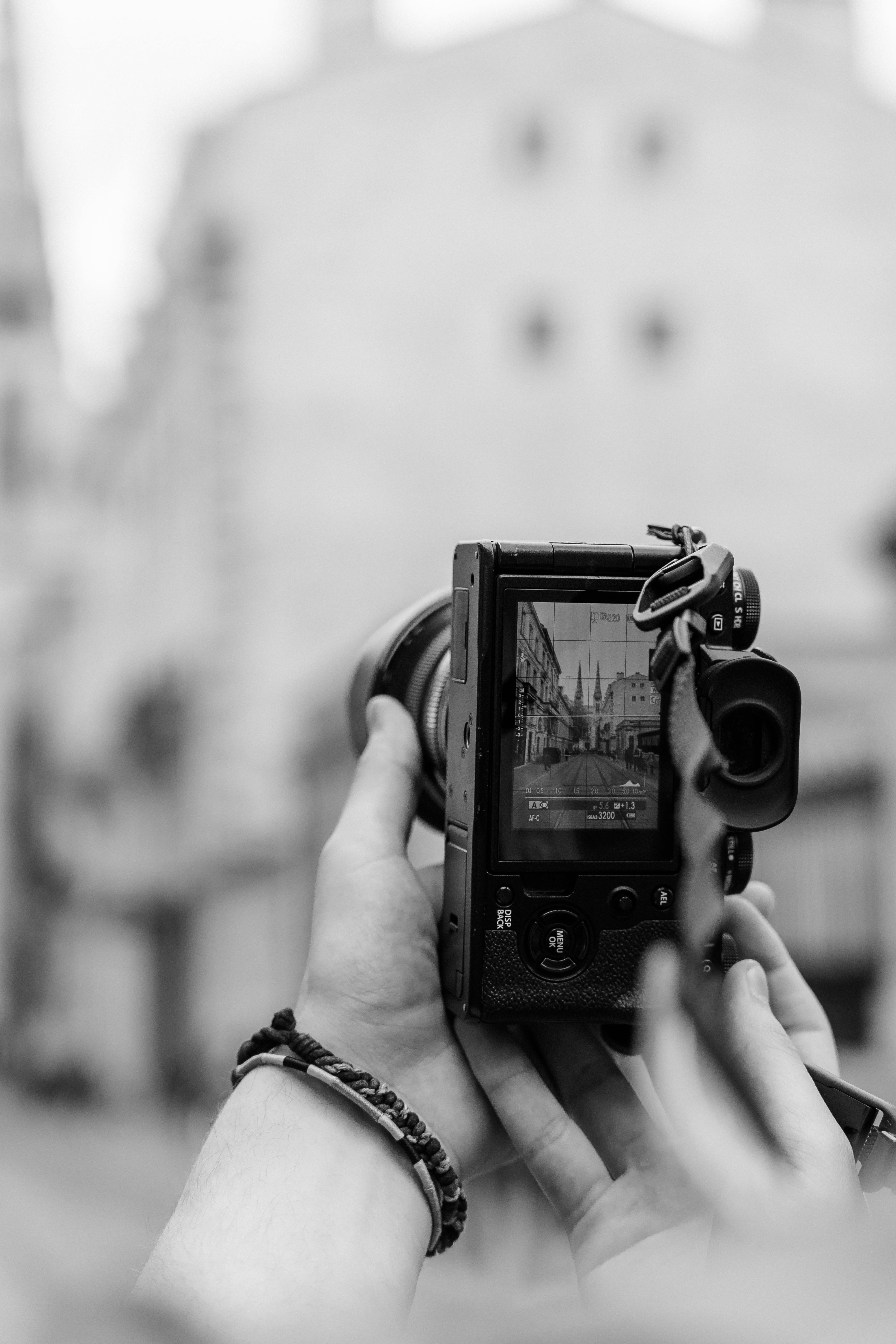 Person Taking Photo using Camera · Free Stock Photo