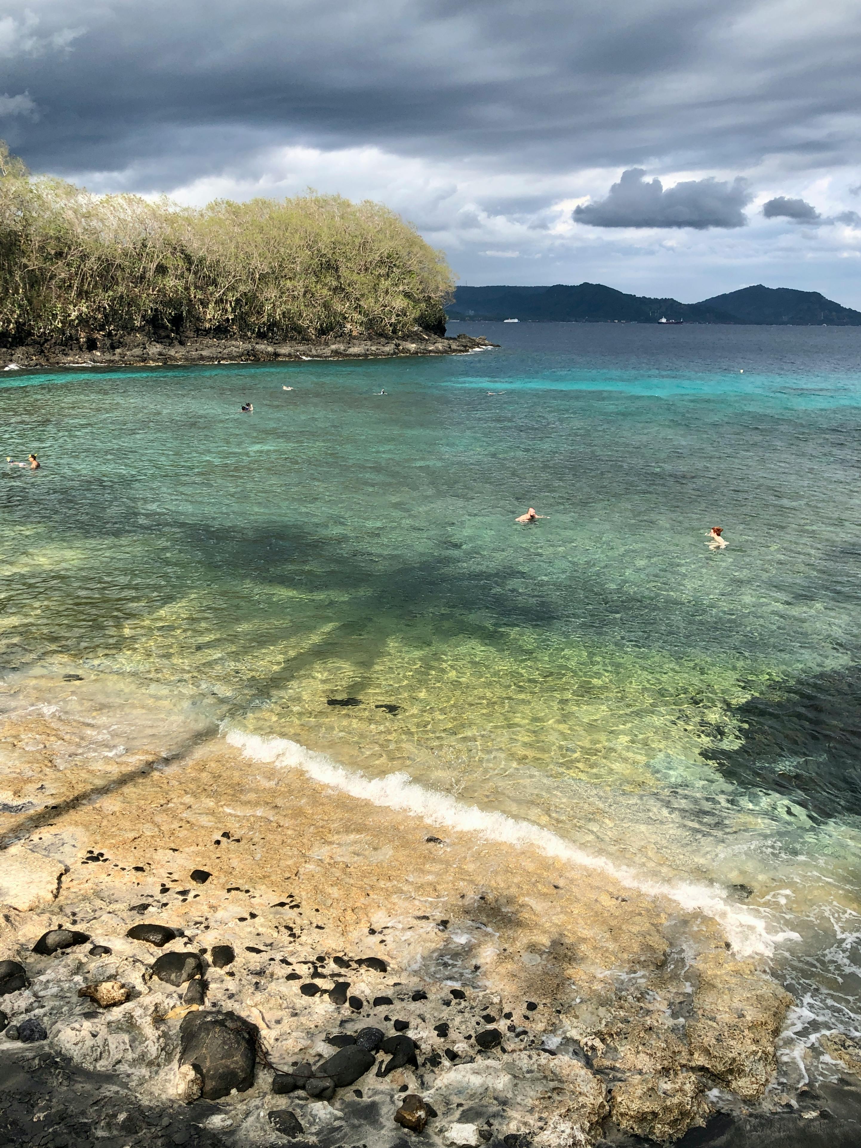 Grayscale Photography of a Woman With Her Legs Cross · Free Stock Photo