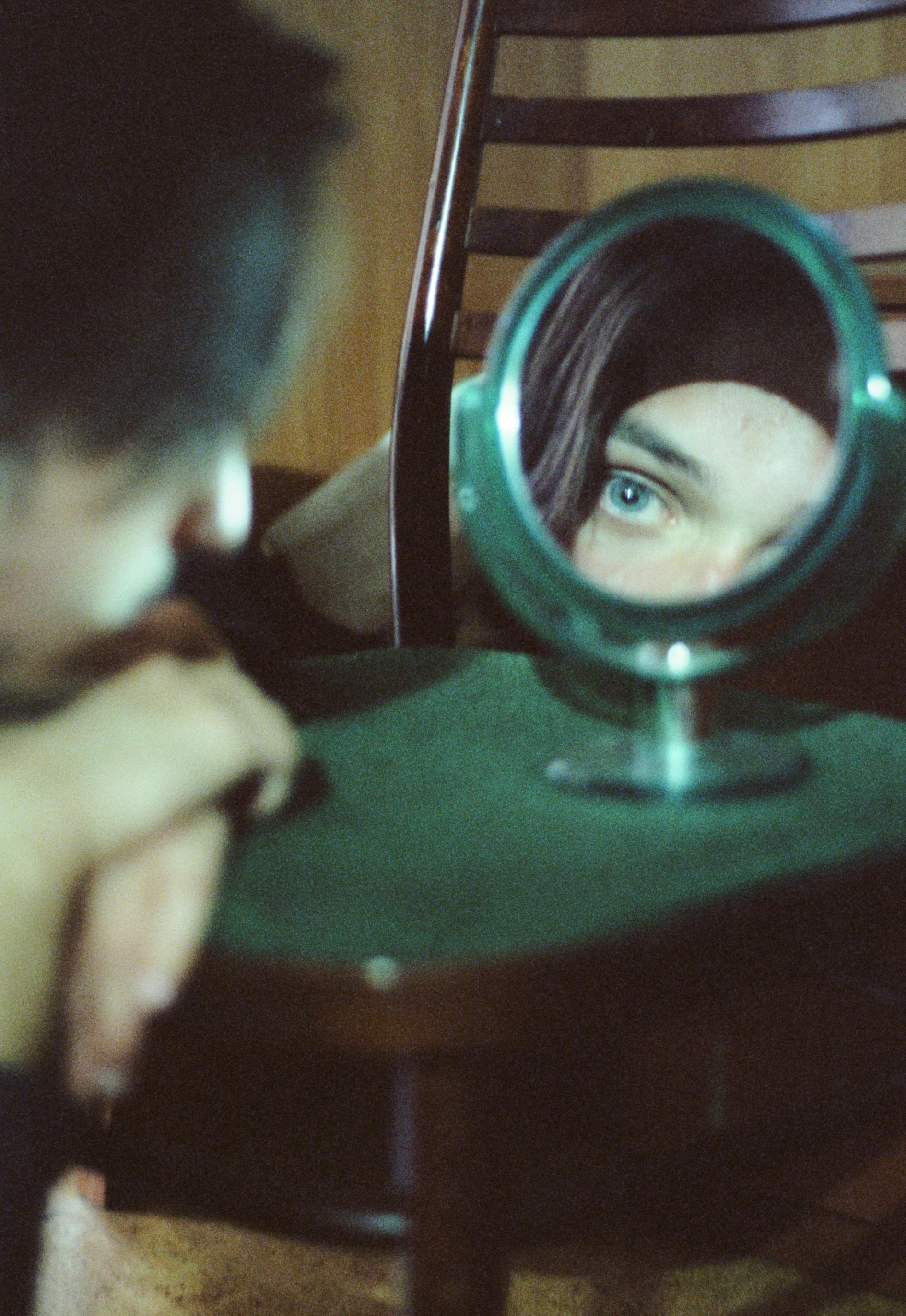 Person Looking at a Mirror · Free Stock Photo