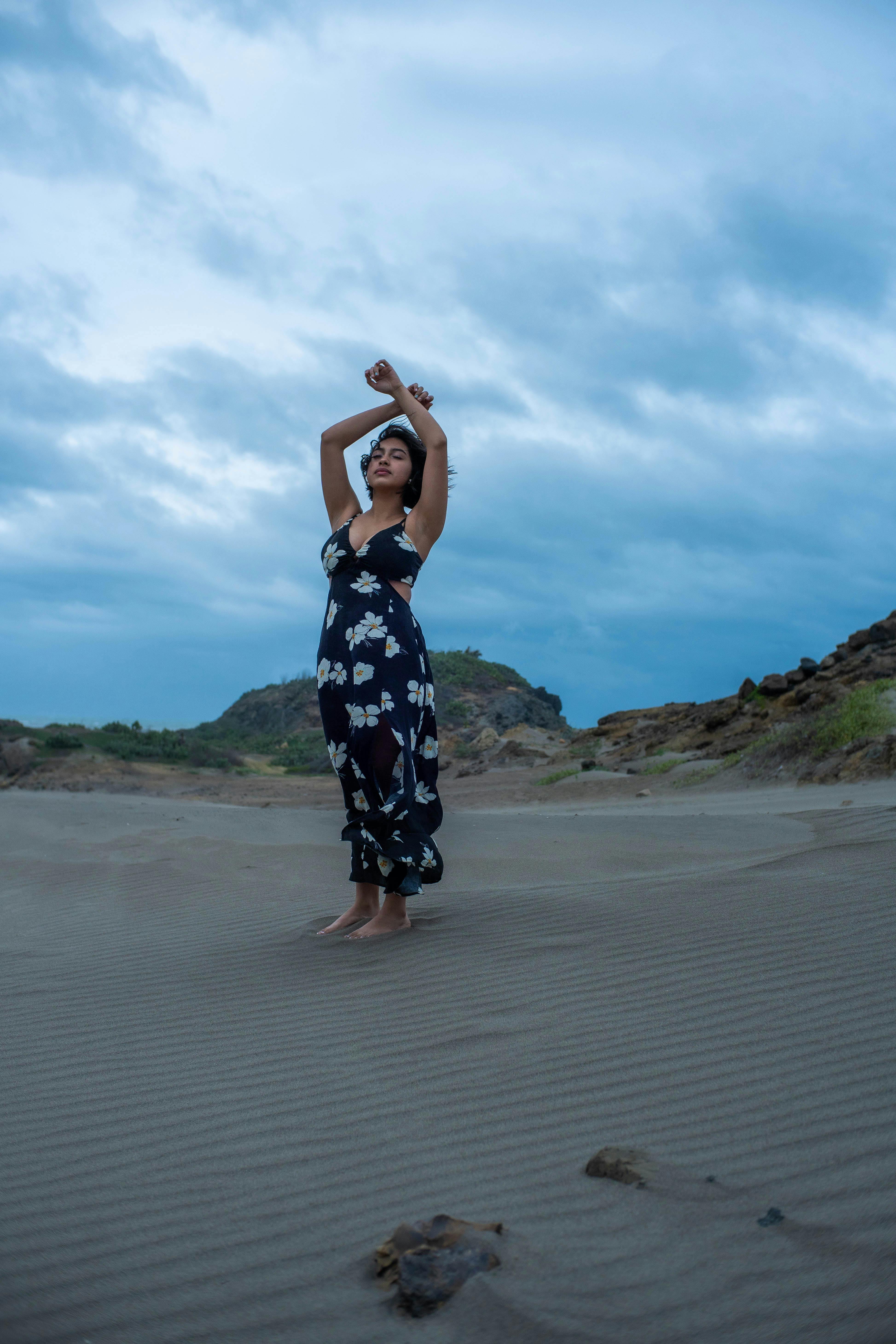 Crying Woman in Blue Dress Raising Hand up · Free Stock Photo
