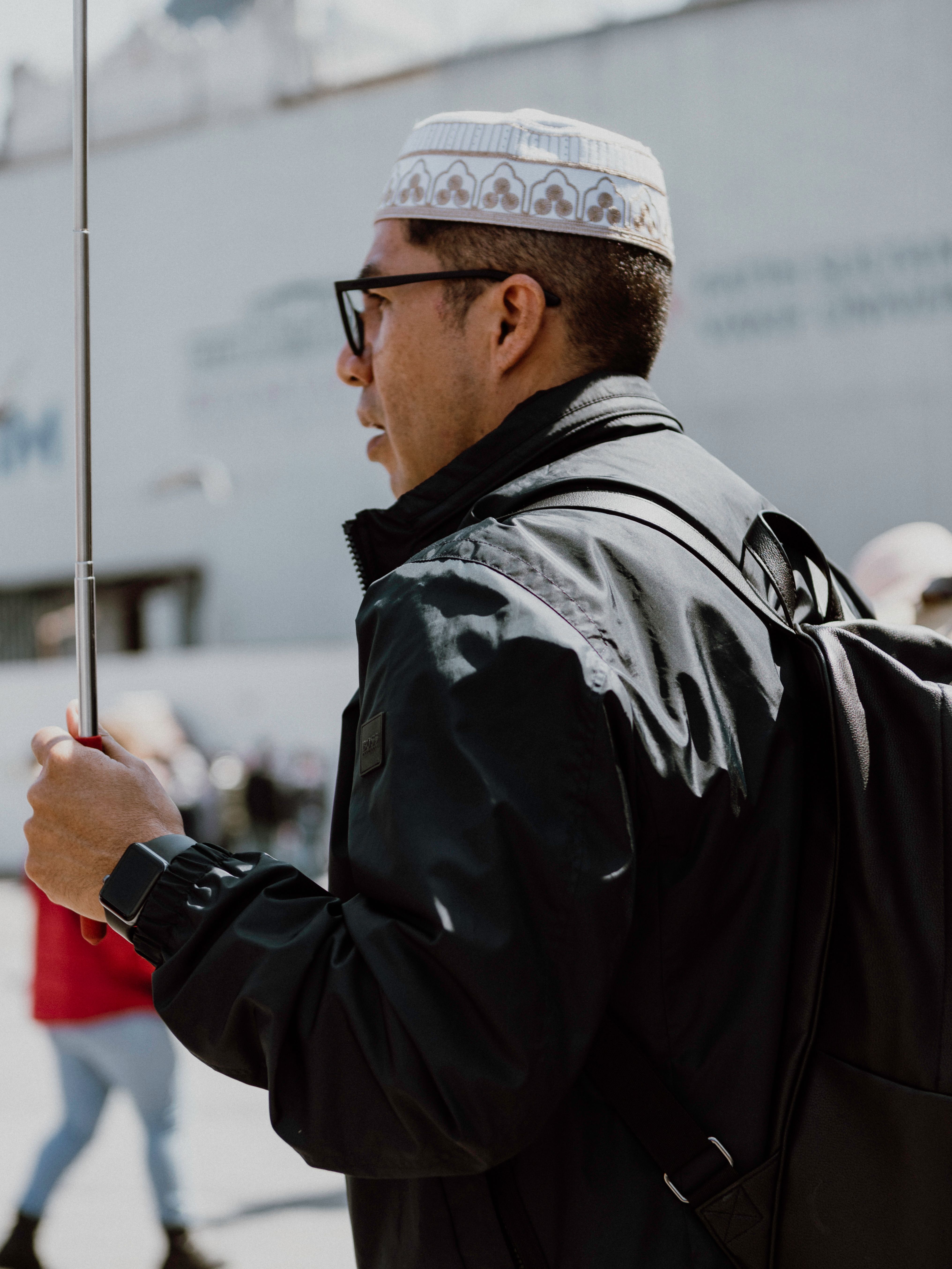Photo of Man Wearing Red Cap · Free Stock Photo