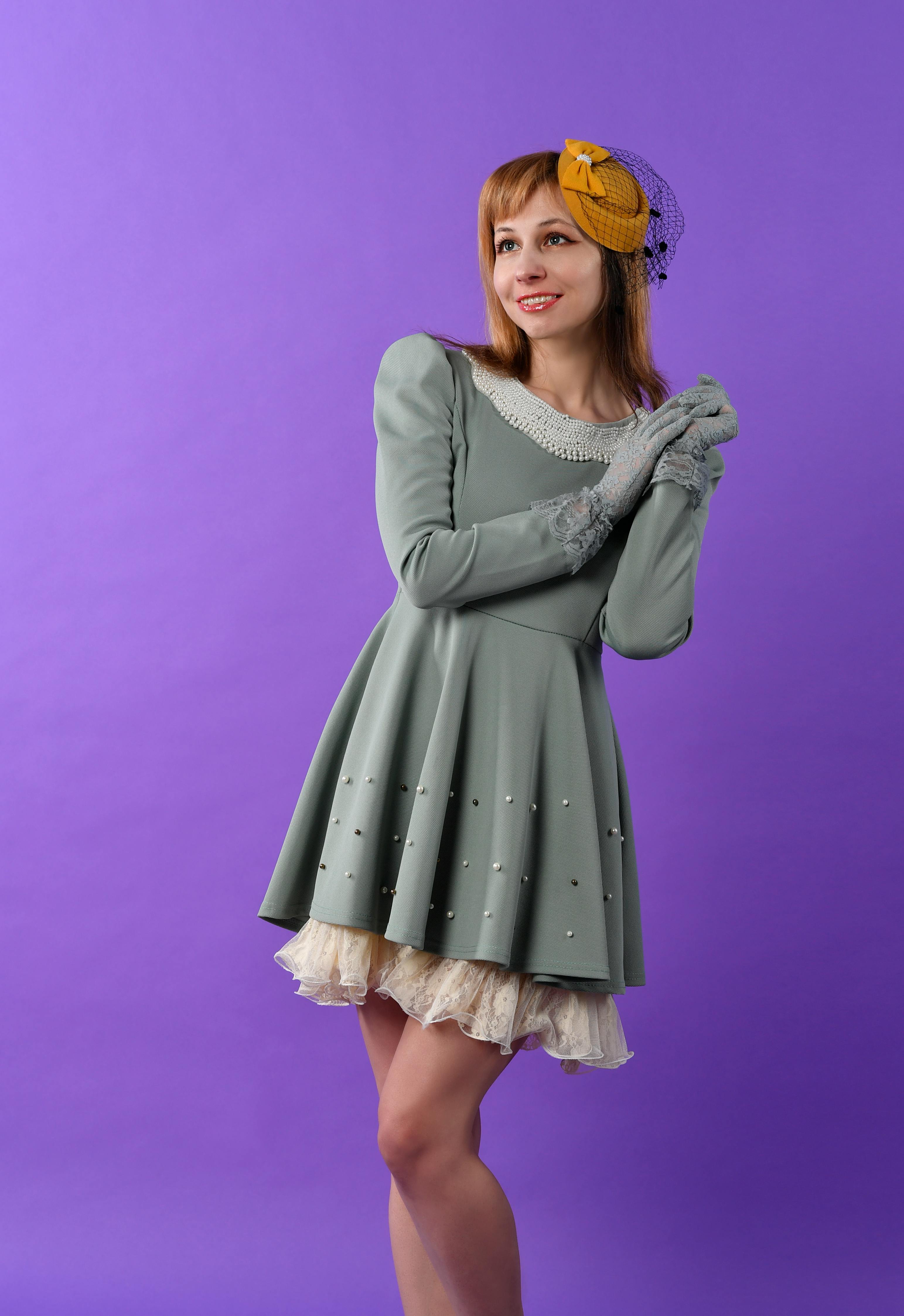 Woman Posing on Purple Background · Free Stock Photo