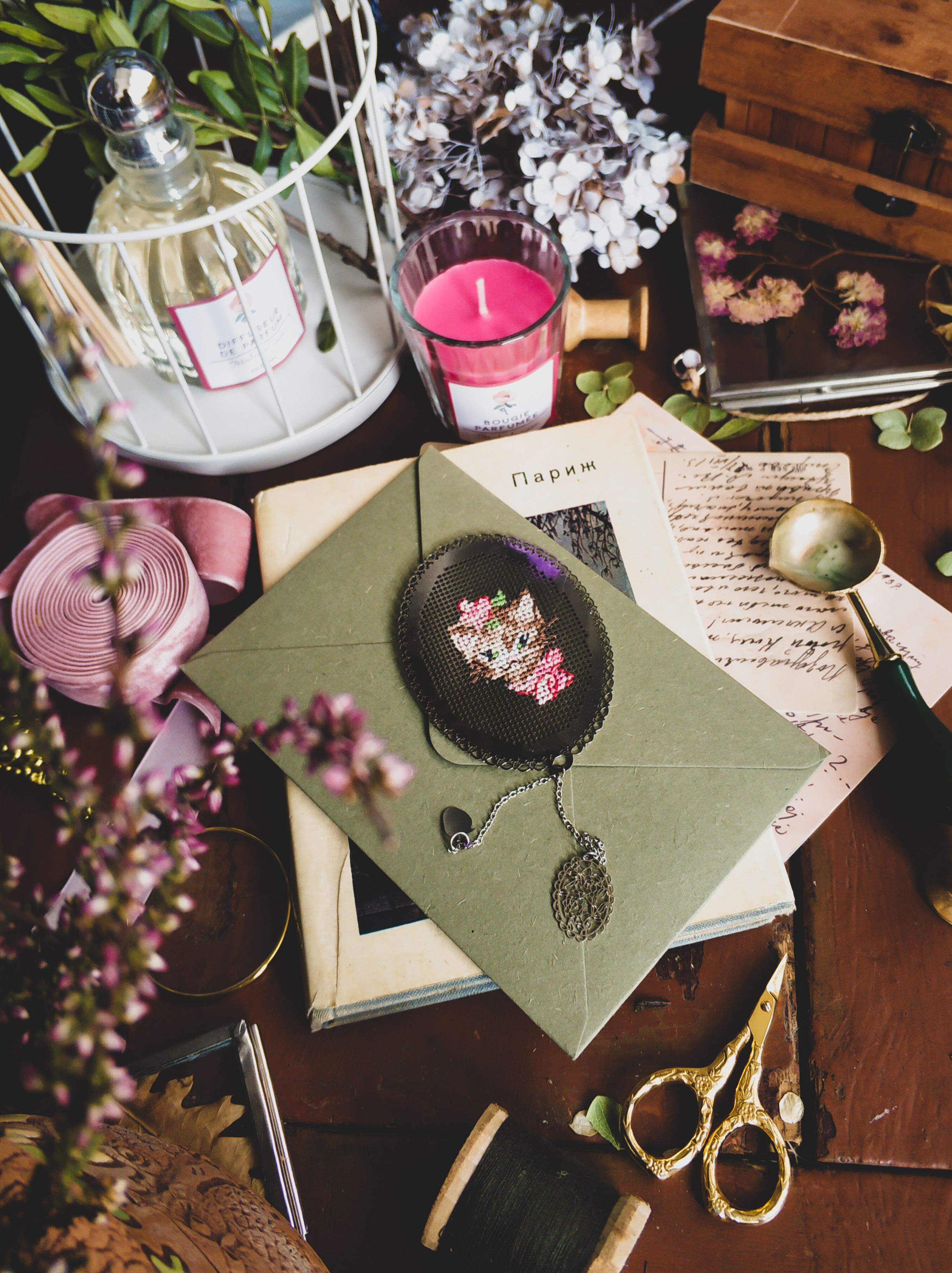 Accessories around Envelope and Pendant · Free Stock Photo
