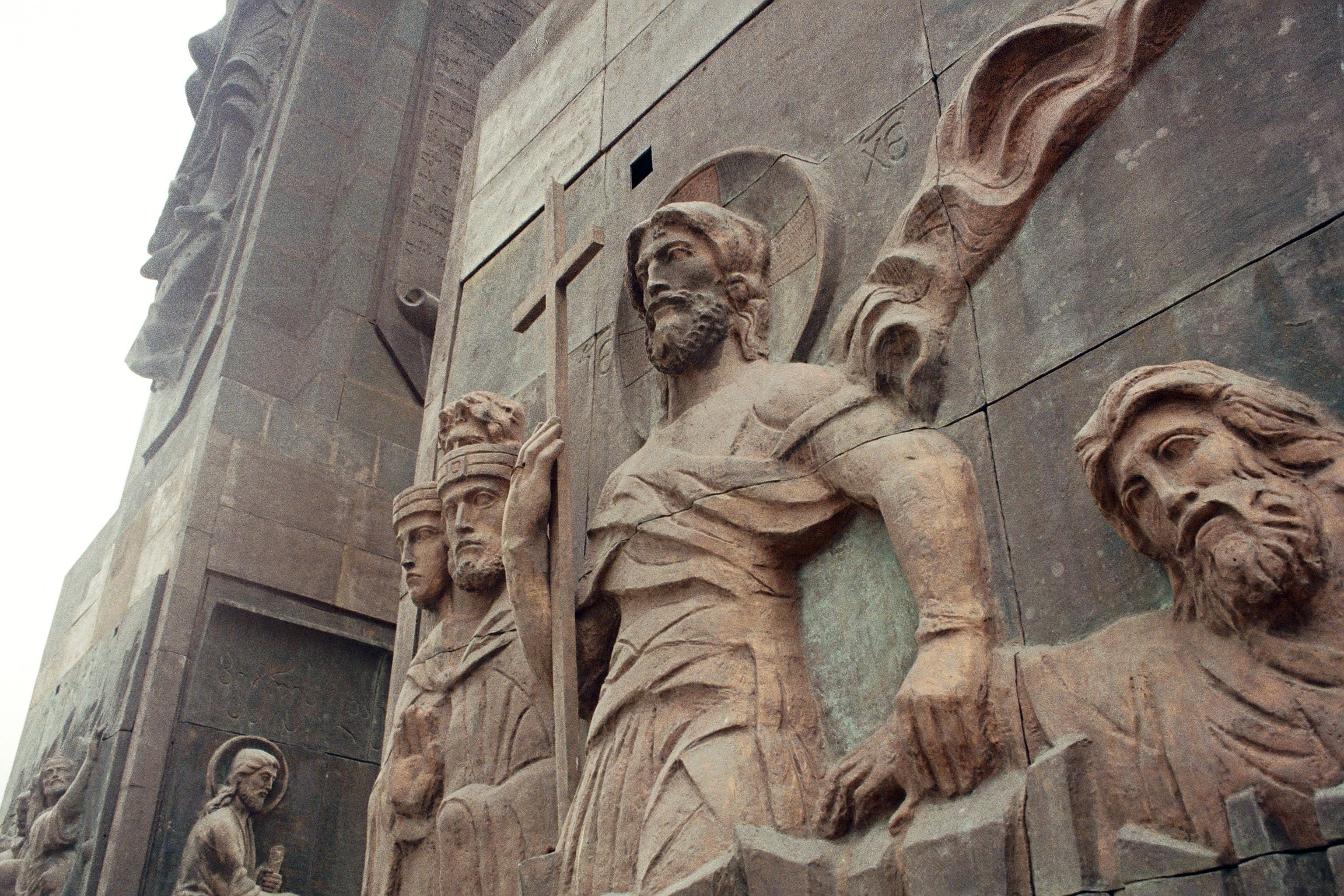 Religious Sculptures on a Building Exterior · Free Stock Photo