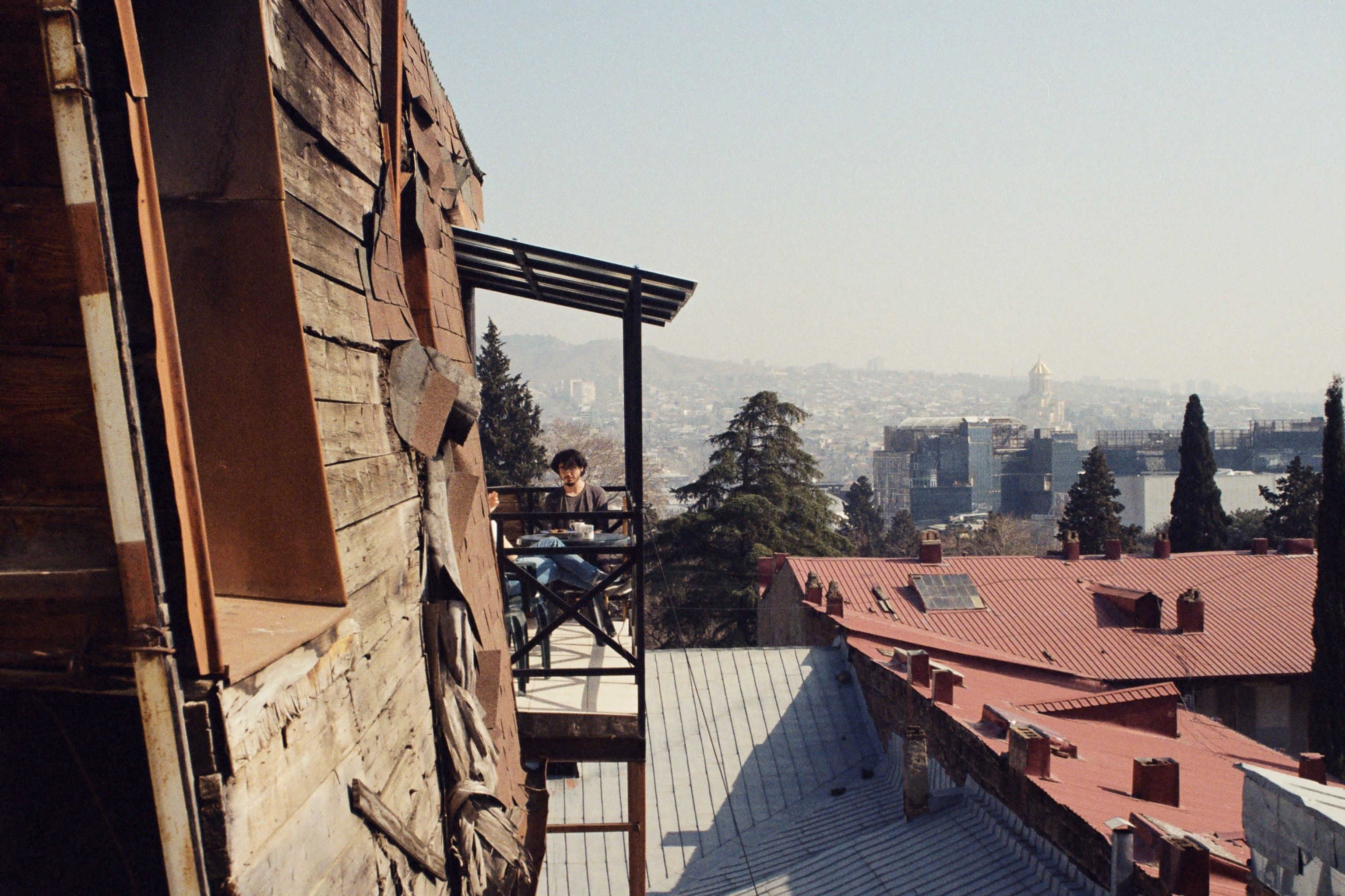 A Person Sitting in Balcony · Free Stock Photo