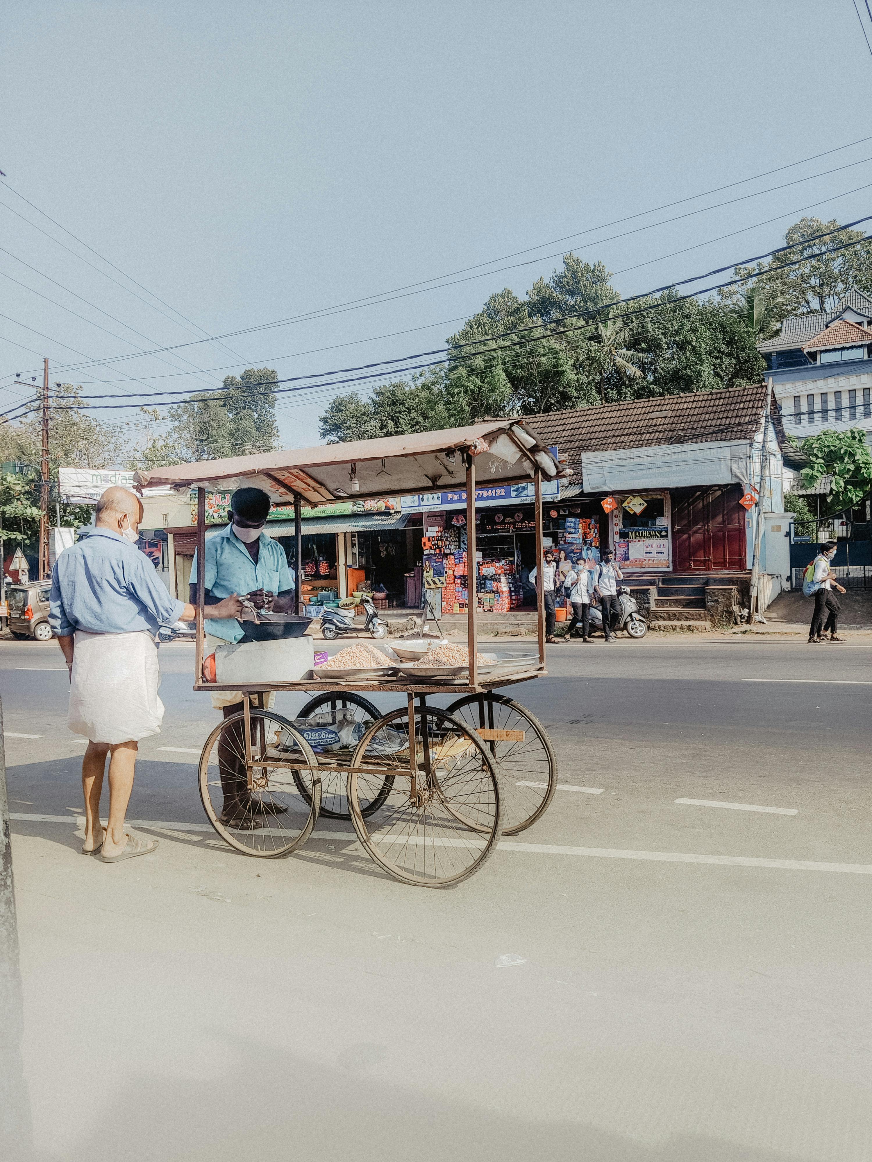 Food cart with hot roasted food · Free Stock Photo