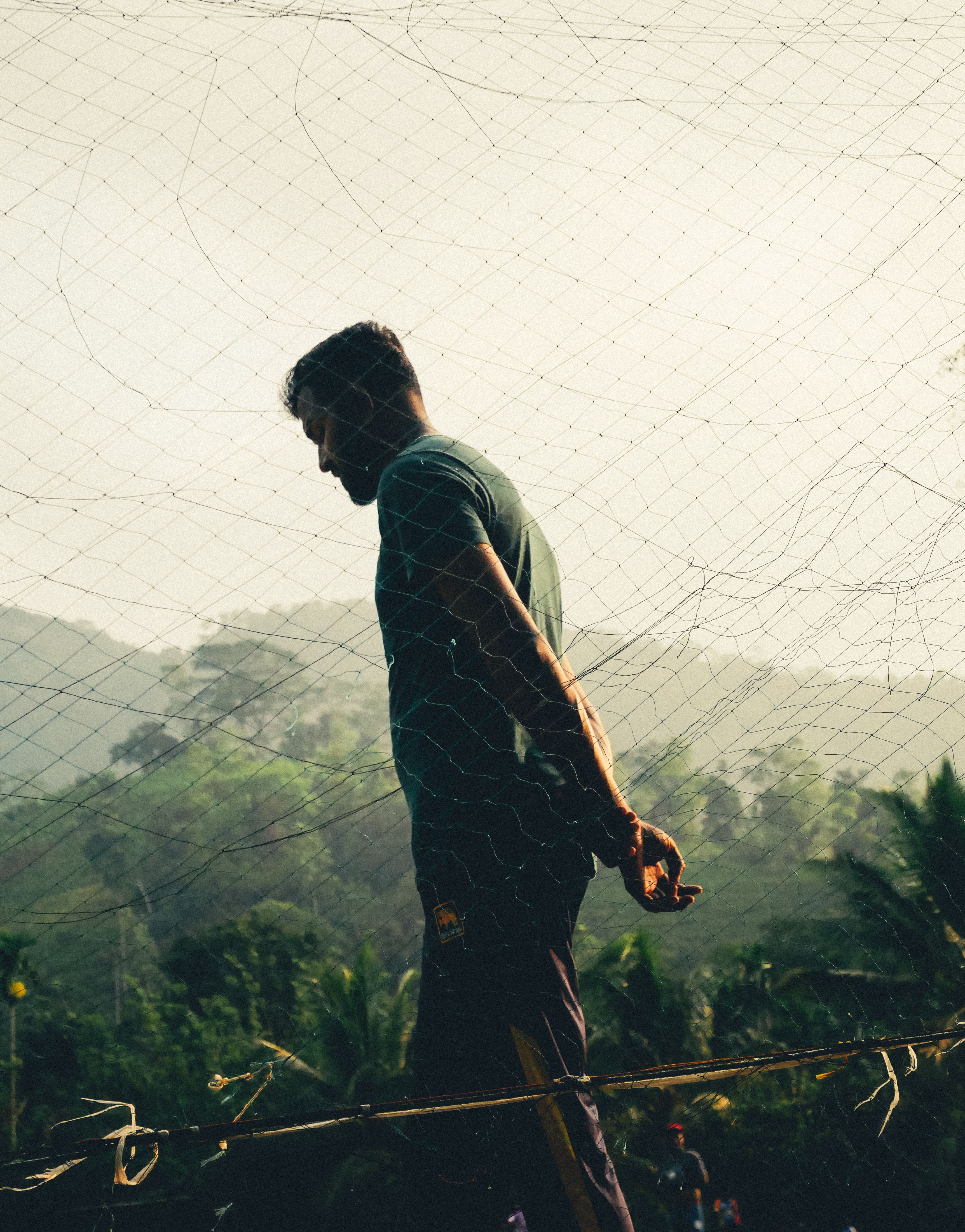 A Man Behind a Fence · Free Stock Photo