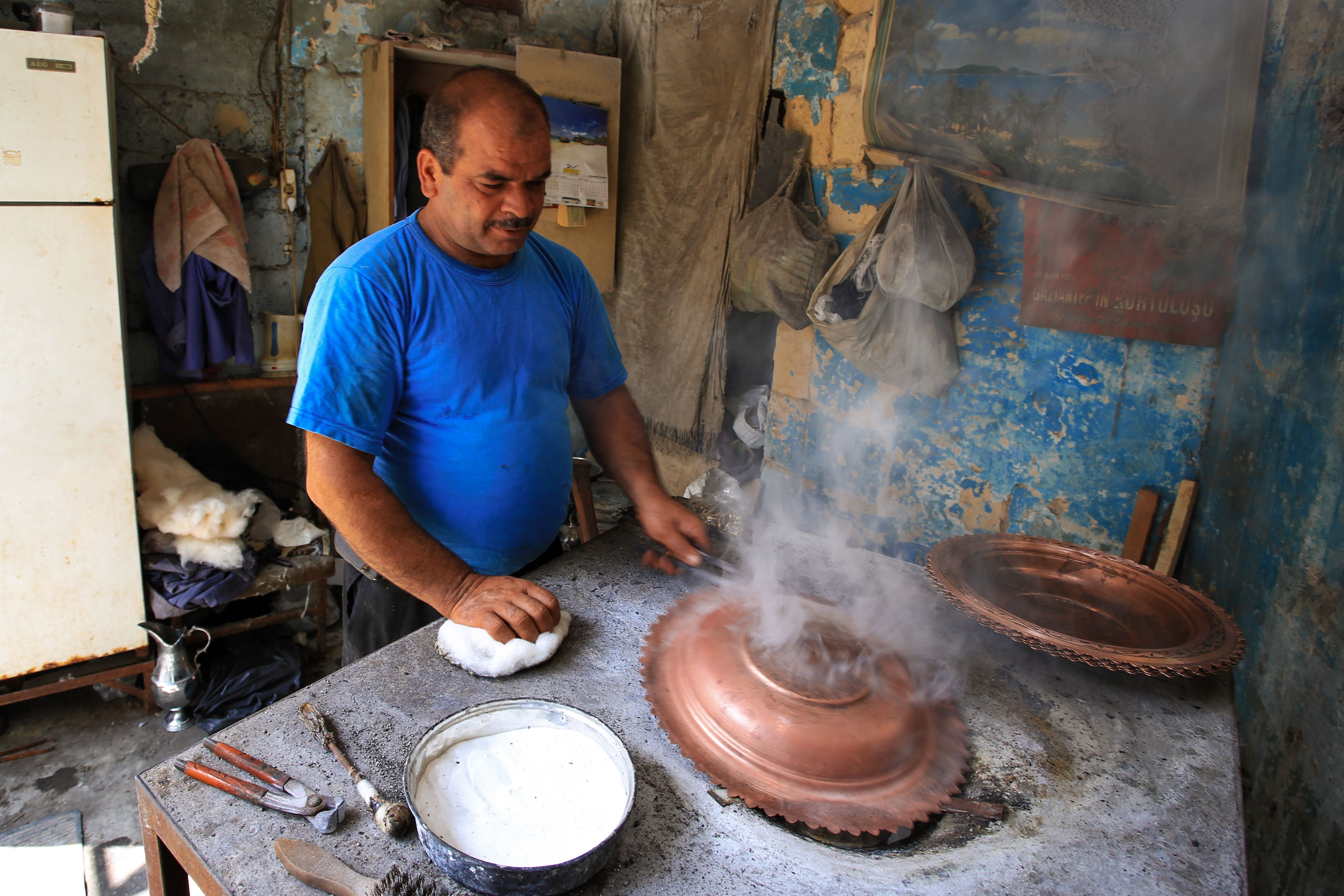 Man Doing Metalwork in a Workshop · Free Stock Photo