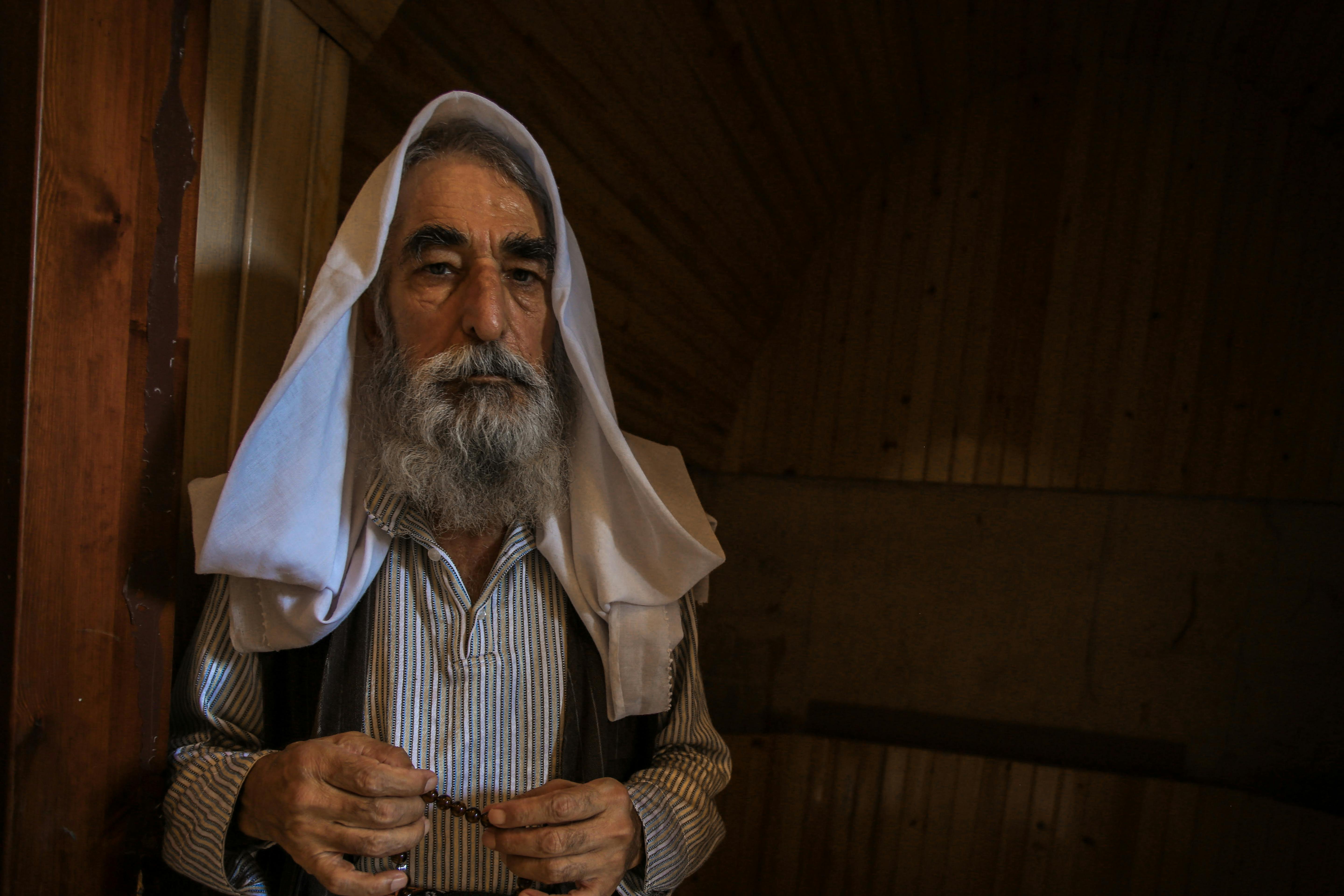 Man Wearing Traditional Clothes Praying · Free Stock Photo