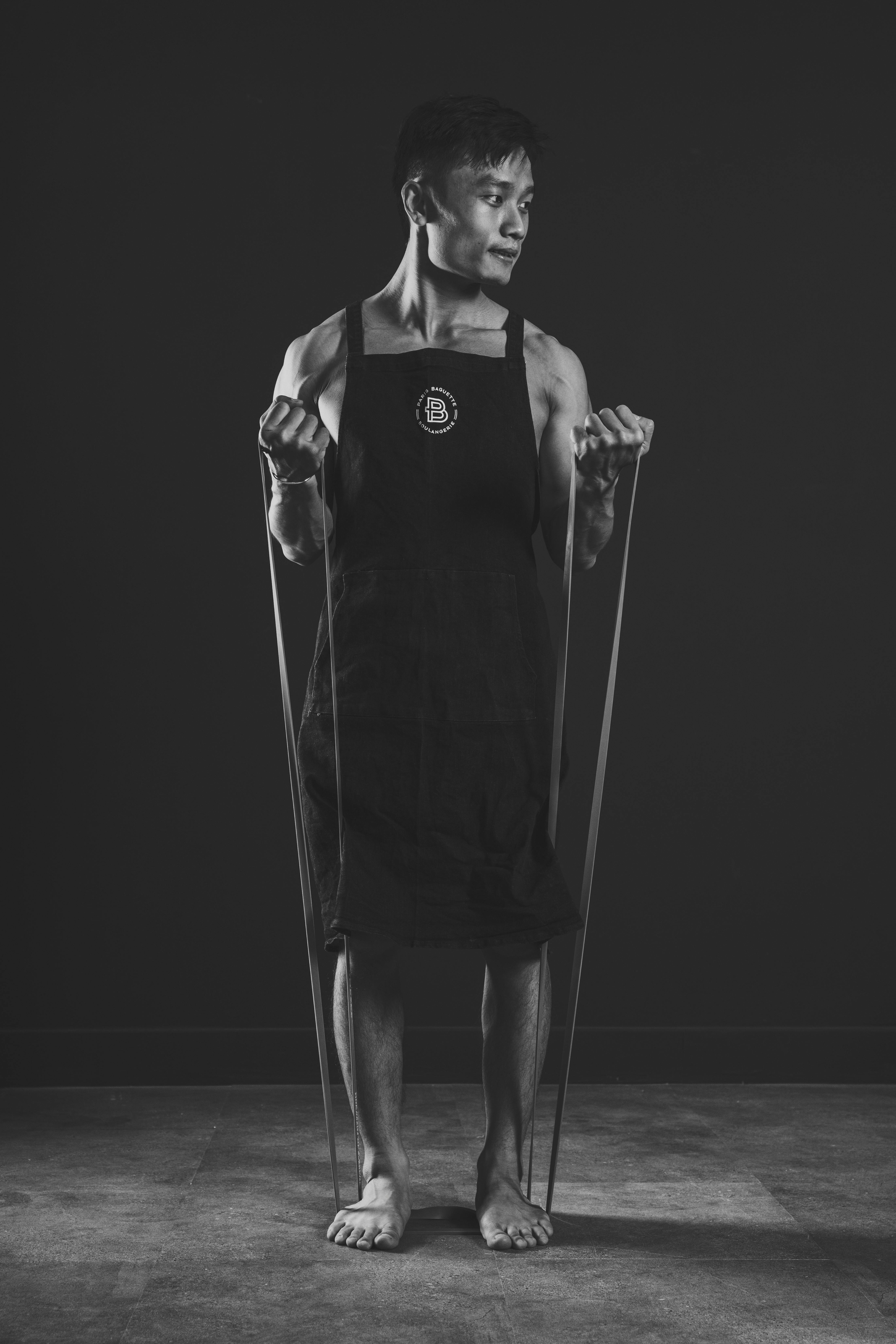 Asian Man in Apron Training in Studio · Free Stock Photo