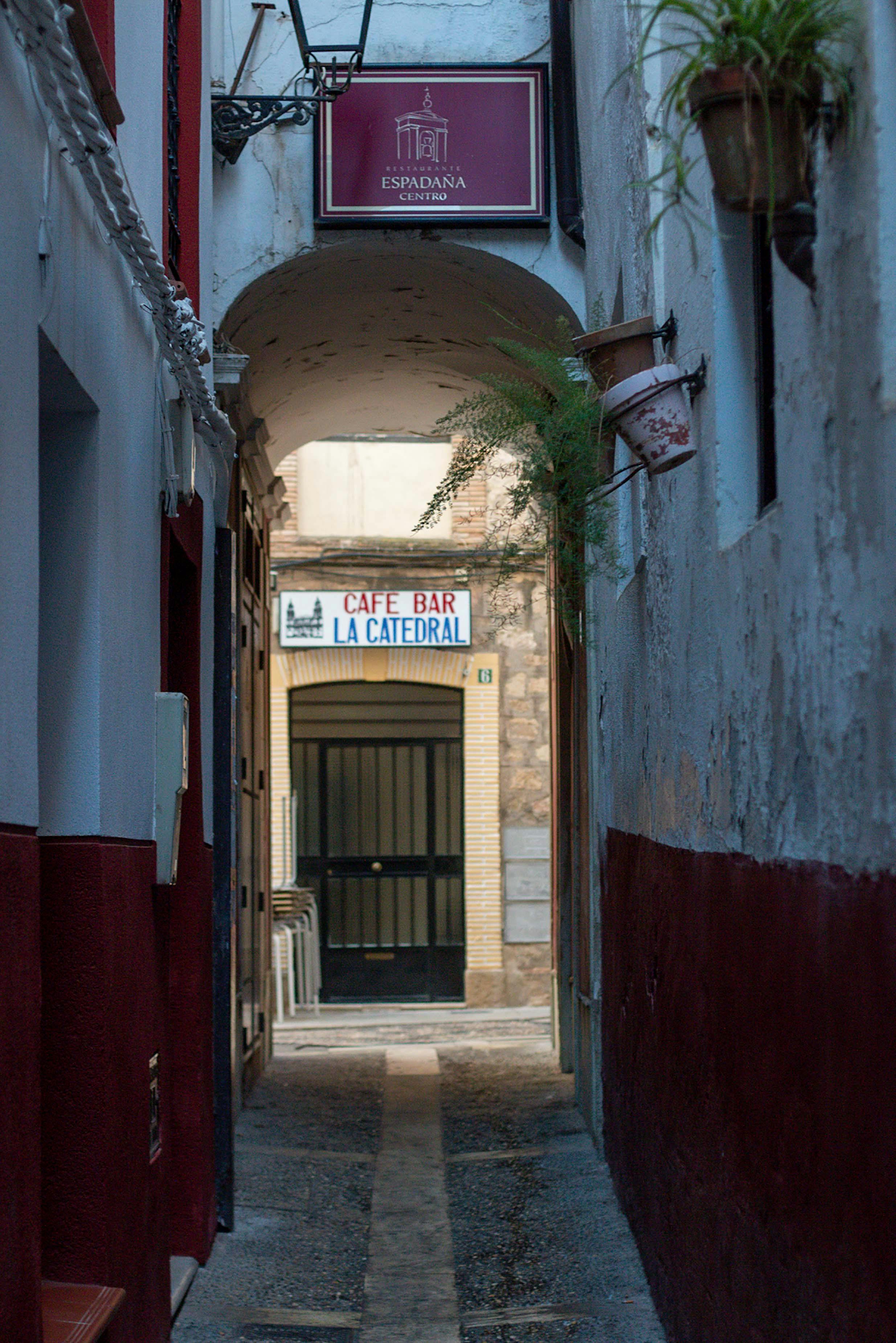 Modern building passageway with arched windows · Free Stock Photo