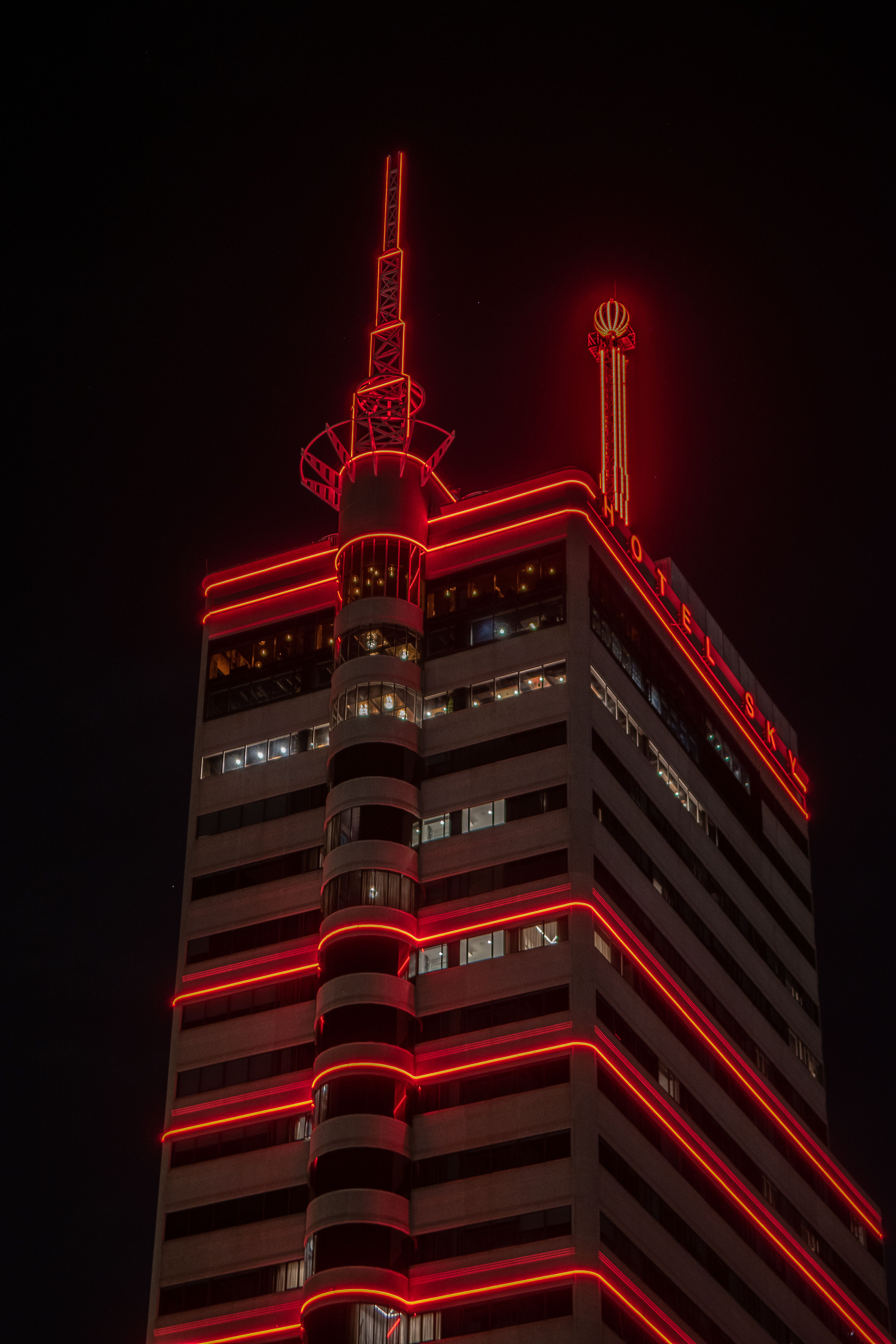Low Angle Shot of a Lighted Building During Night Time · Free Stock Photo