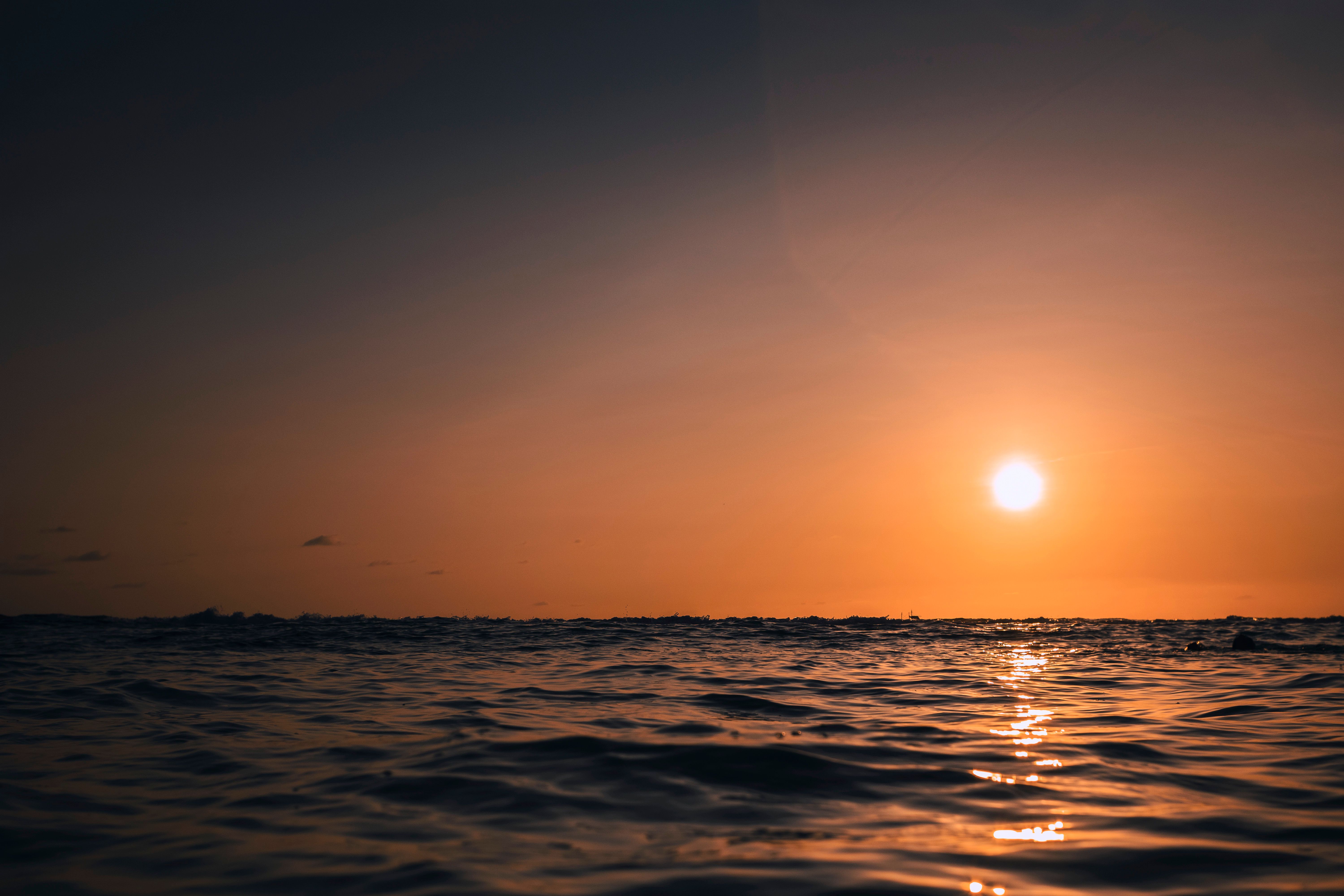 View of Sunset Over Body of Water · Free Stock Photo