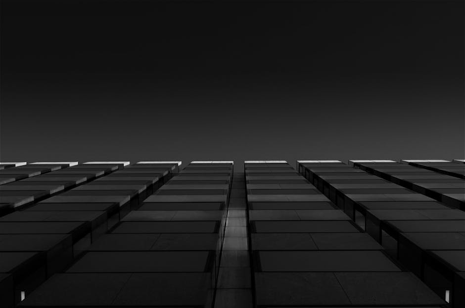 Grayscale Photo of Concrete Building · Free Stock Photo Grayscale Photo of Concrete Building · Free Stock Photo