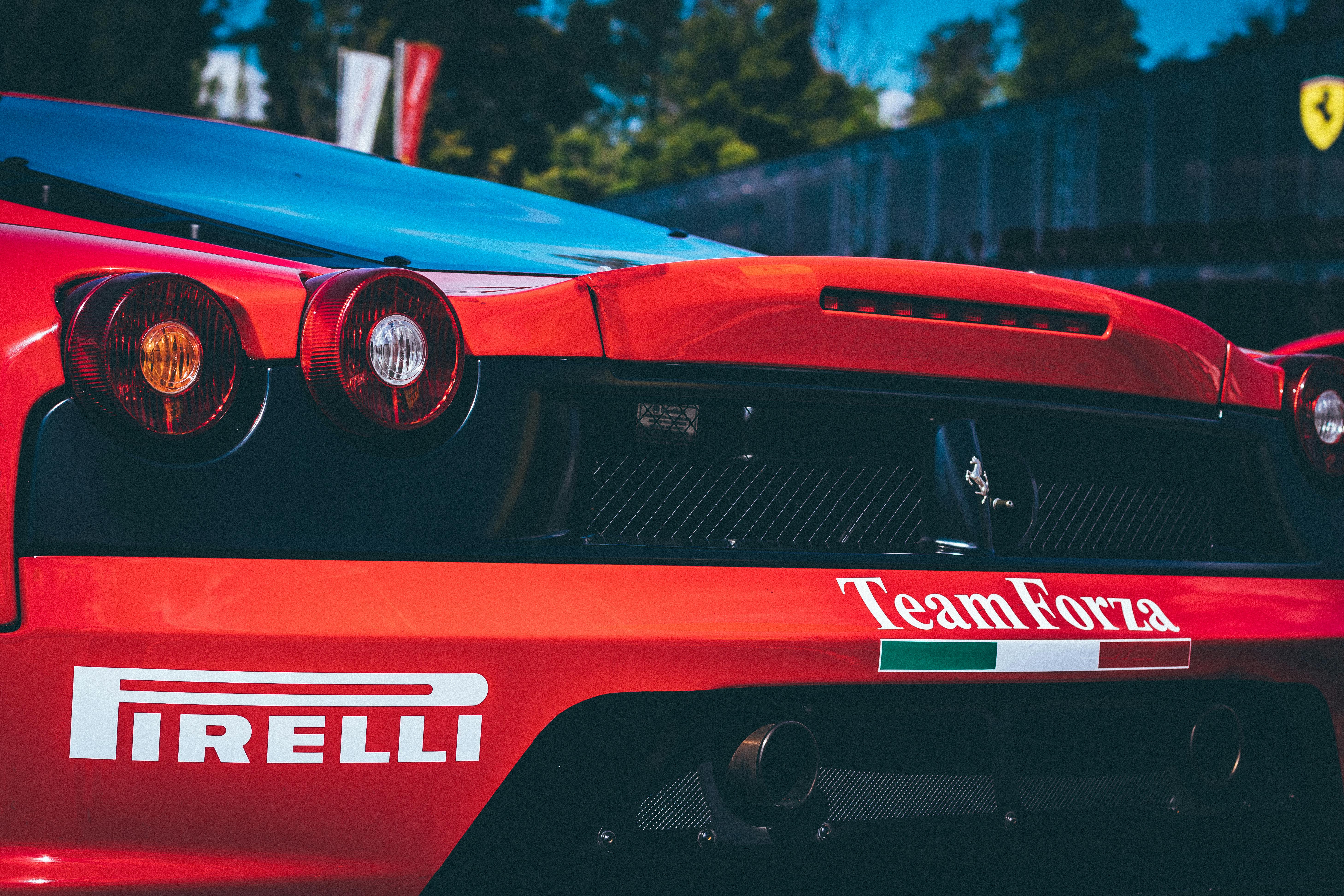 Branded Rear Part of Racing Car · Free Stock Photo