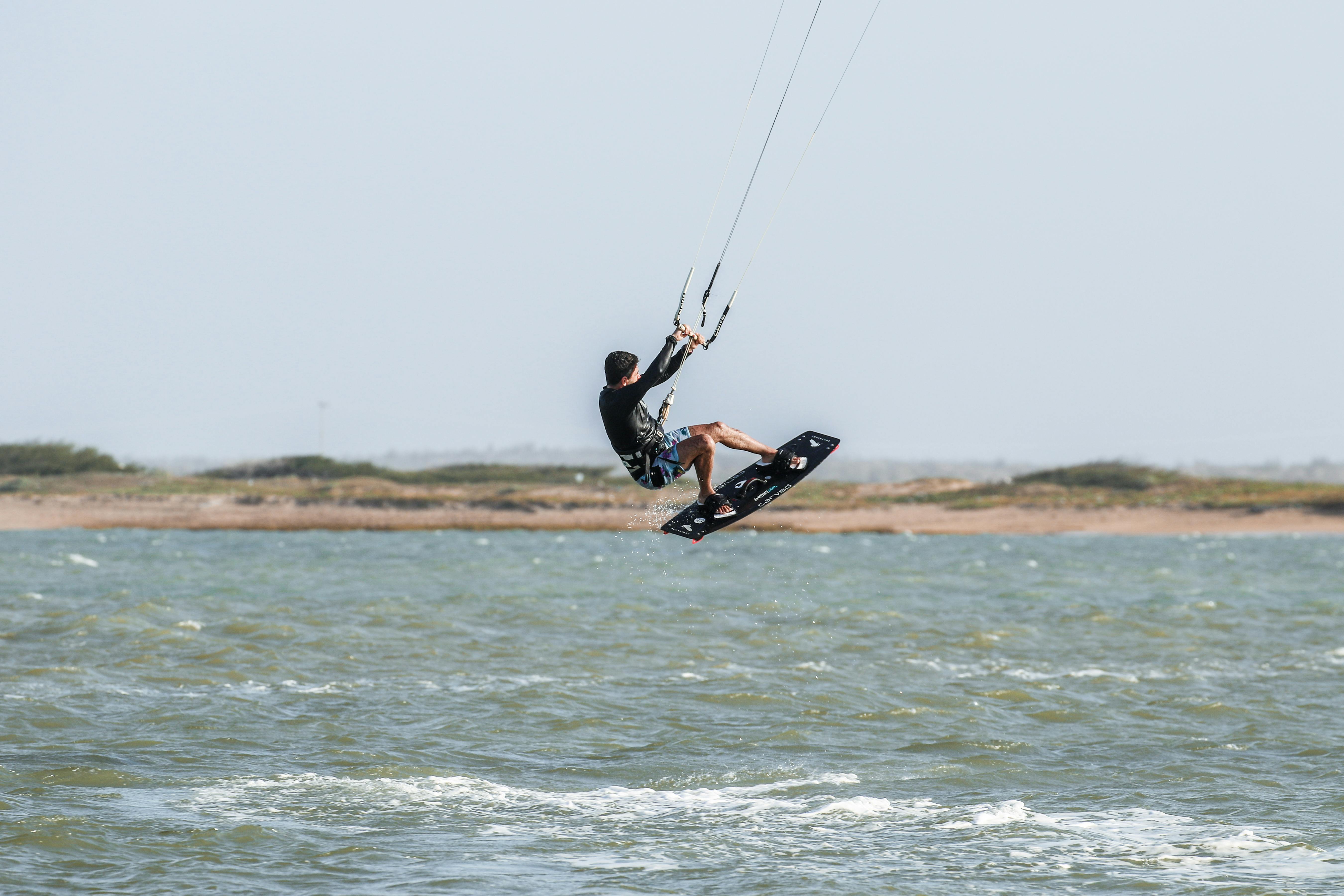 Photo of People Wing Foiling on a Sea · Free Stock Photo