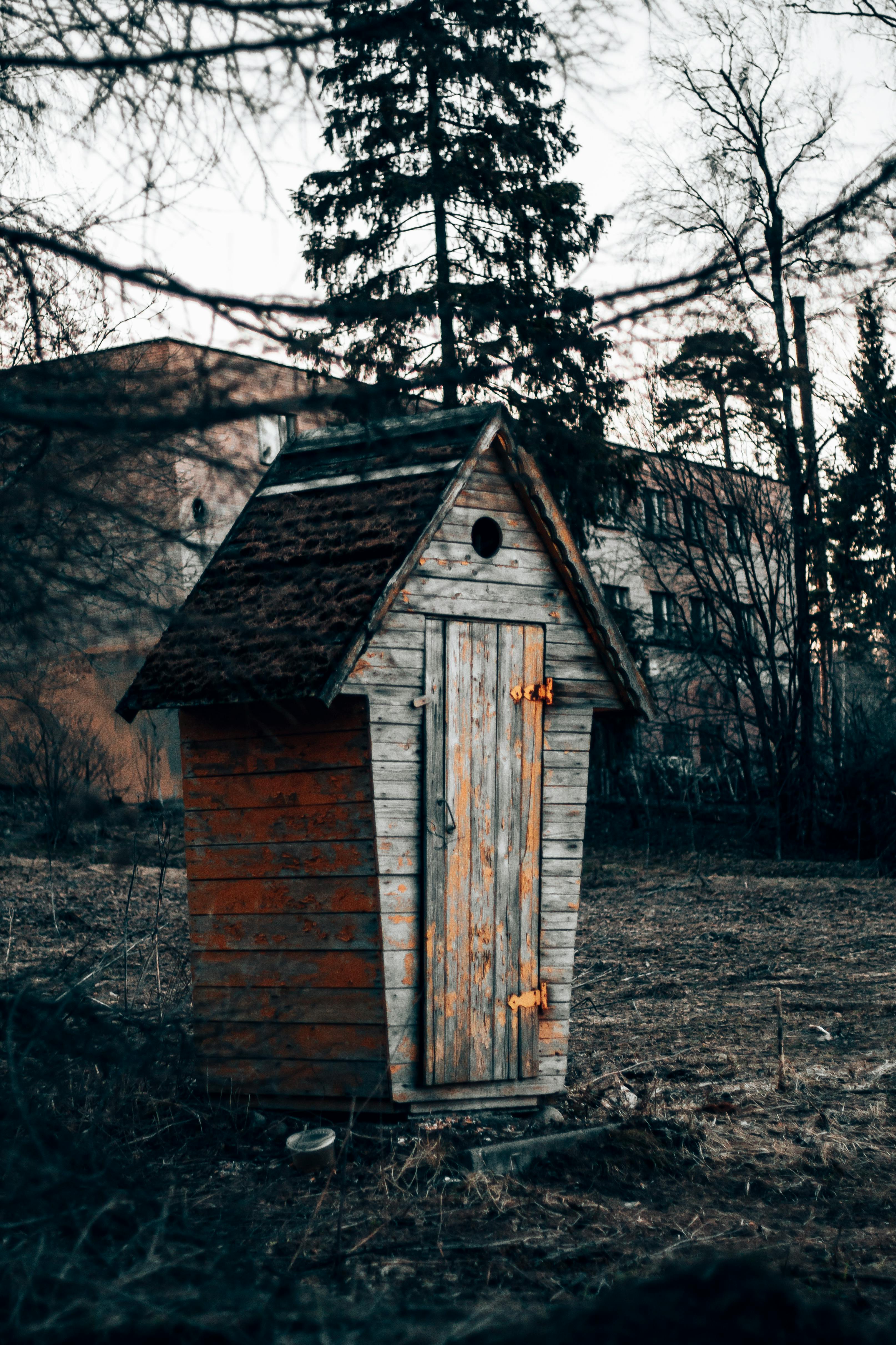 Photo of a Wooden Outhouse · Free Stock Photo