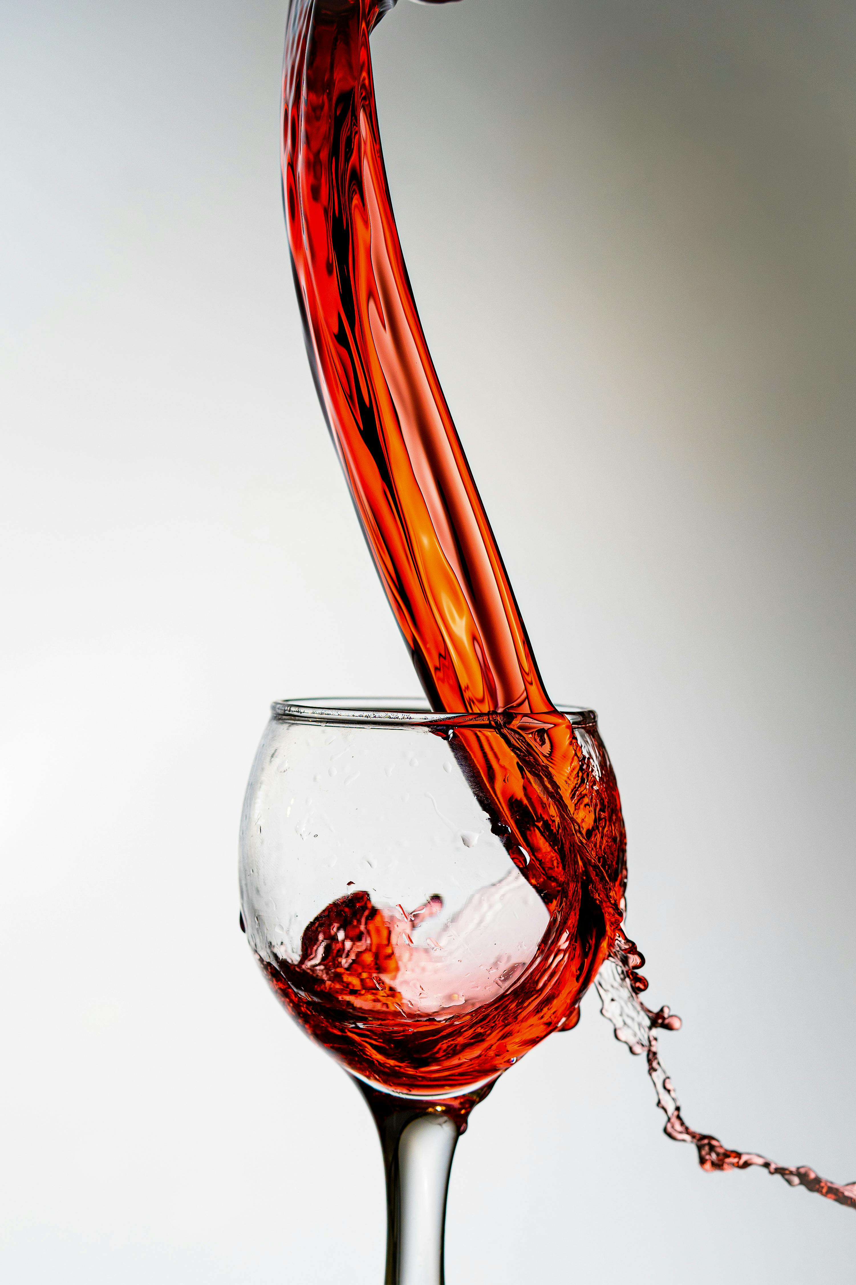 Red Liquid in Clear Wine Glass · Free Stock Photo