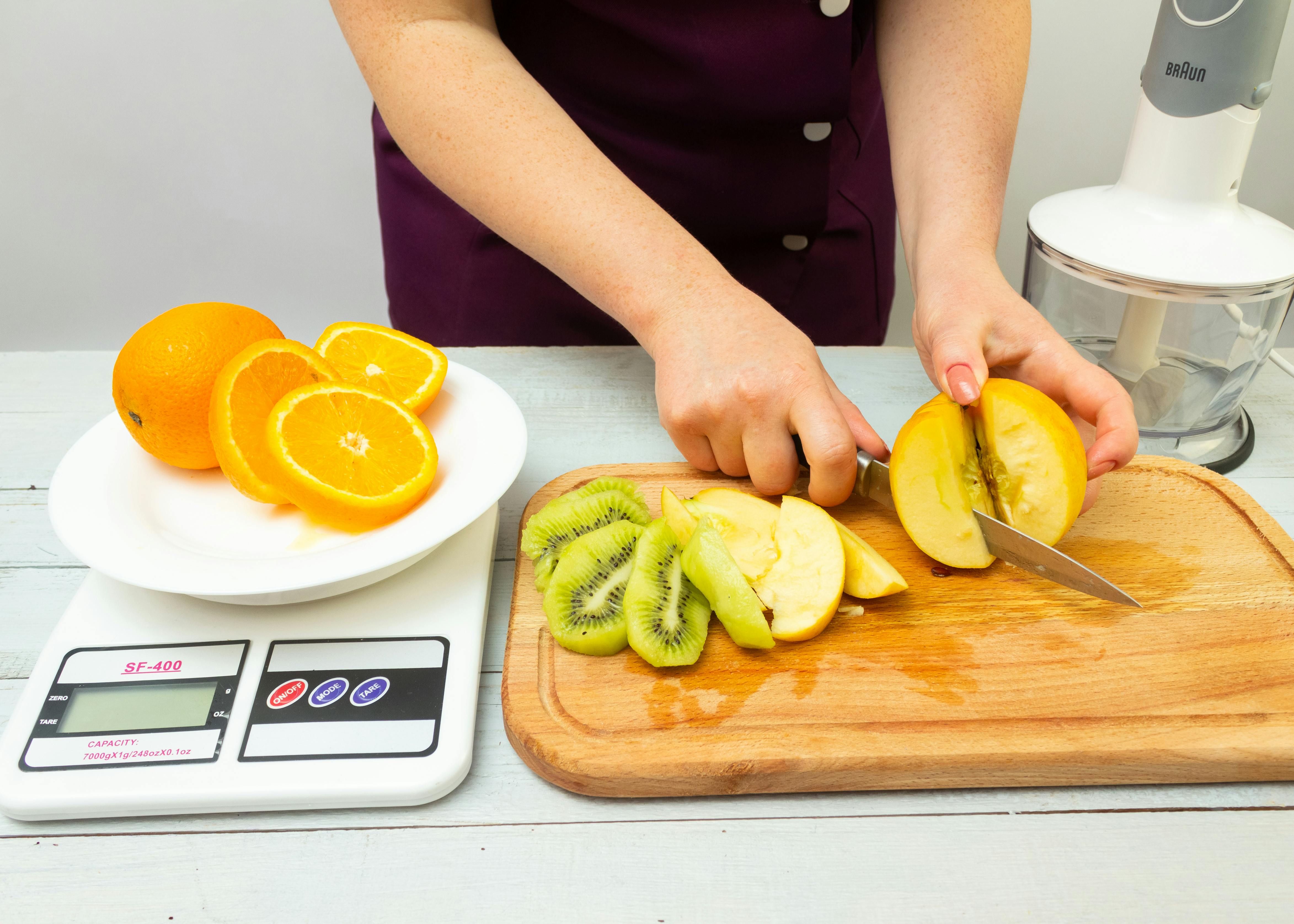 A Person Slicing Fruits · Free Stock Photo