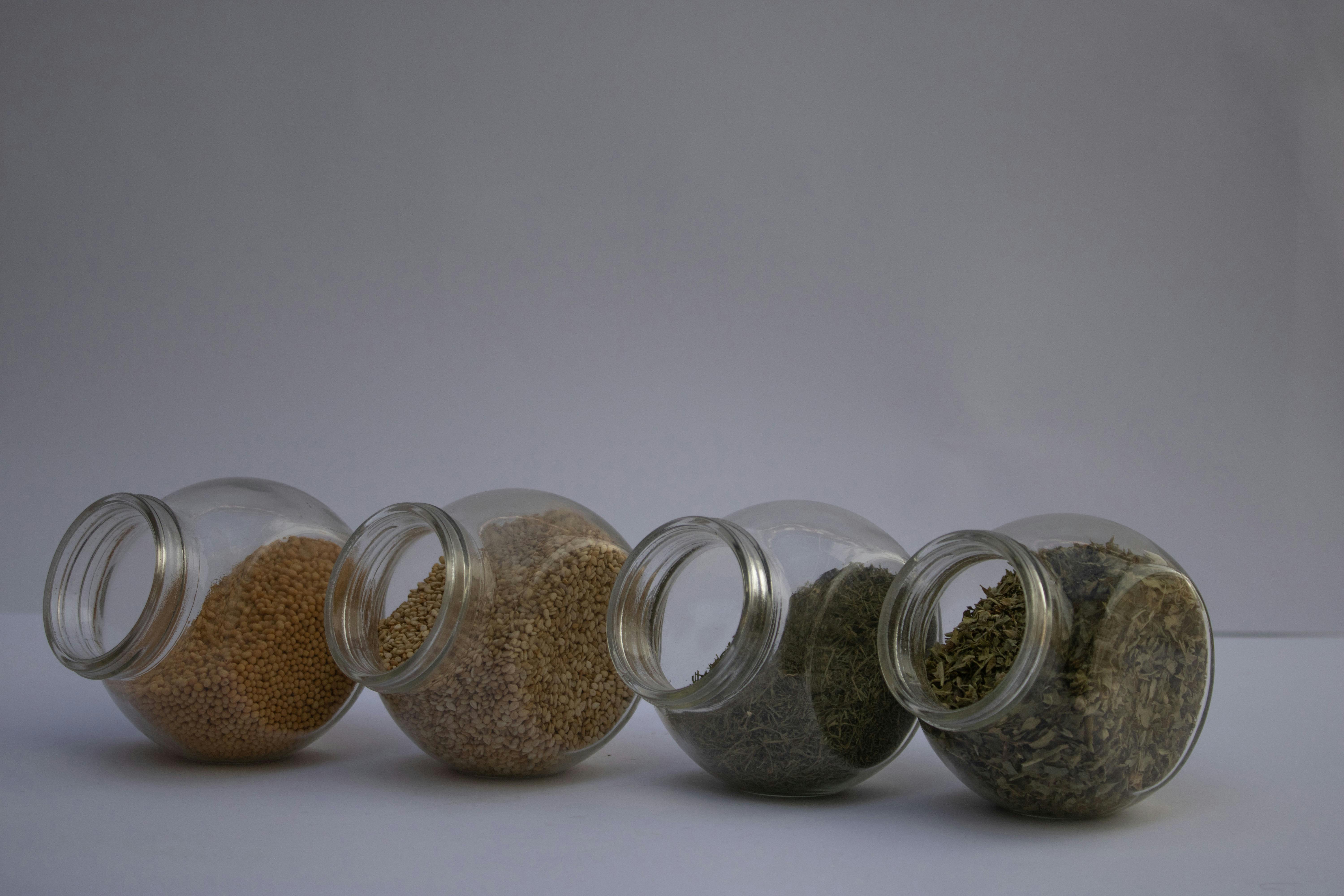 Clear Glass Jars With Brown Powder · Free Stock Photo