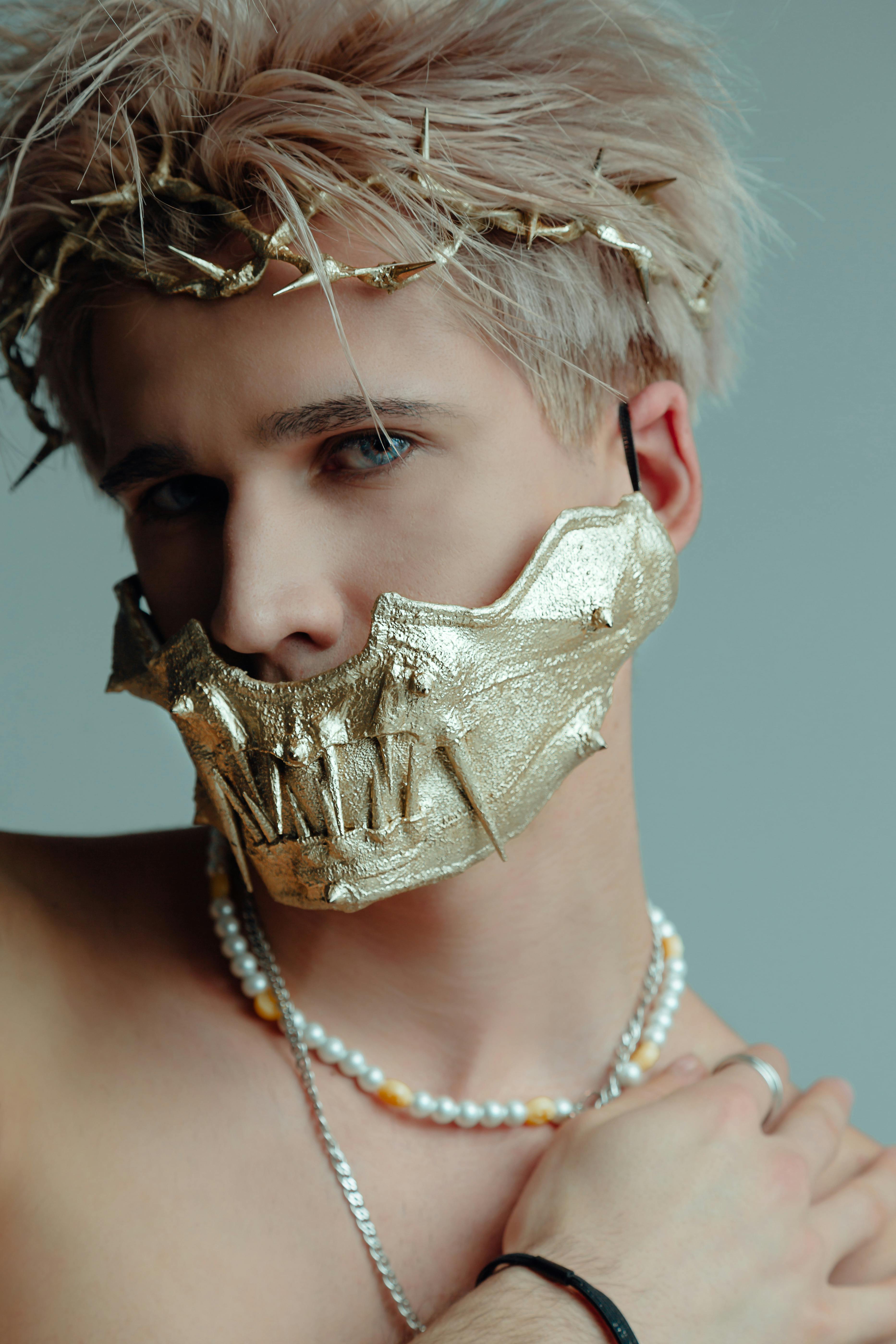 Man with Blonde Hair in a Gold Mask and a Headpiece · Free Stock Photo
